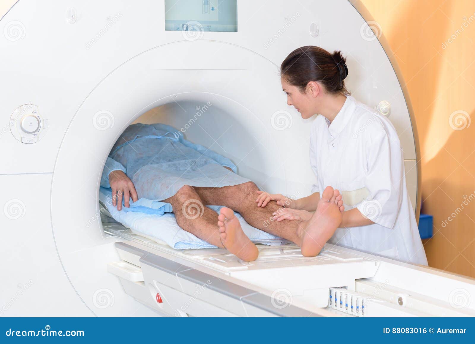 Nurse Holding Legs Patient in Scanner Stock Photo - Image of ...