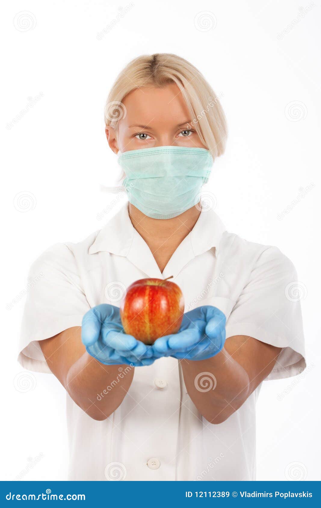 Nurse holding red apple stock image. Image of fruit, blue - 12112389