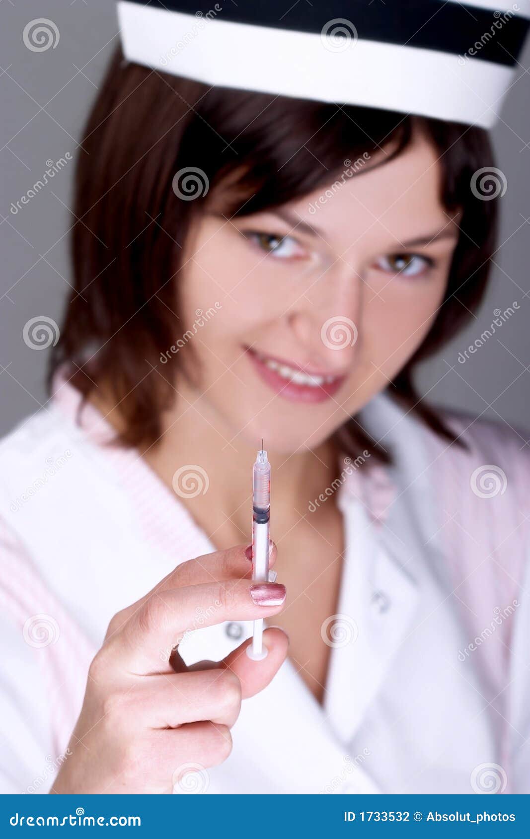 Nurse holding syringe stock photo. Image of medical, attractive - 1733532