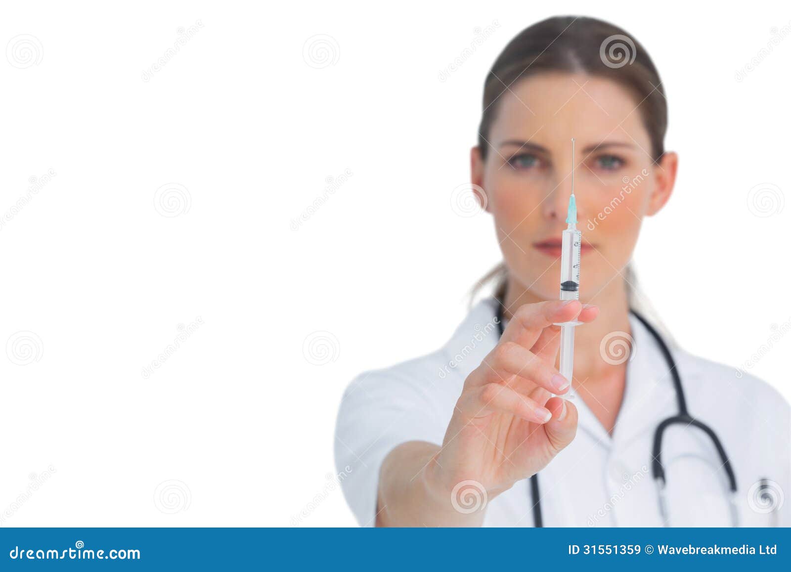 Nurse holding a syringe stock image. Image of pretty - 31551359