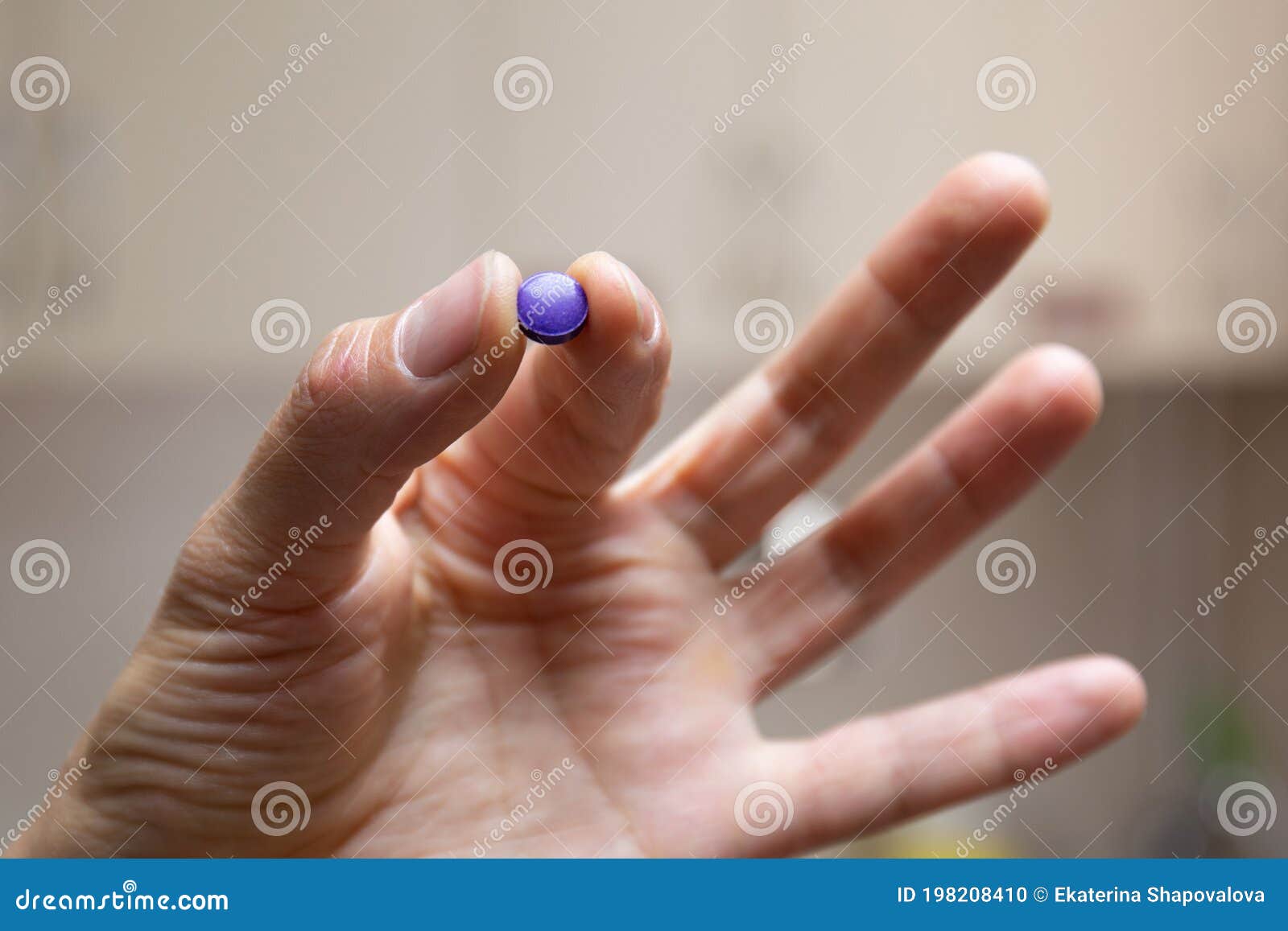 The Nurse Holds the Plaque Indication Tablets in a Pinch Stock Photo ...