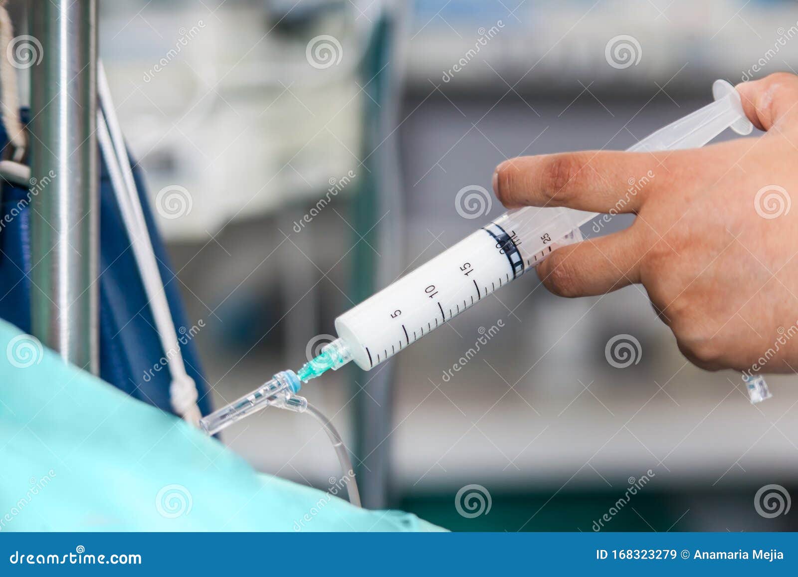 Nurse Injecting a Drug through an Infusion System Stock Image - Image ...