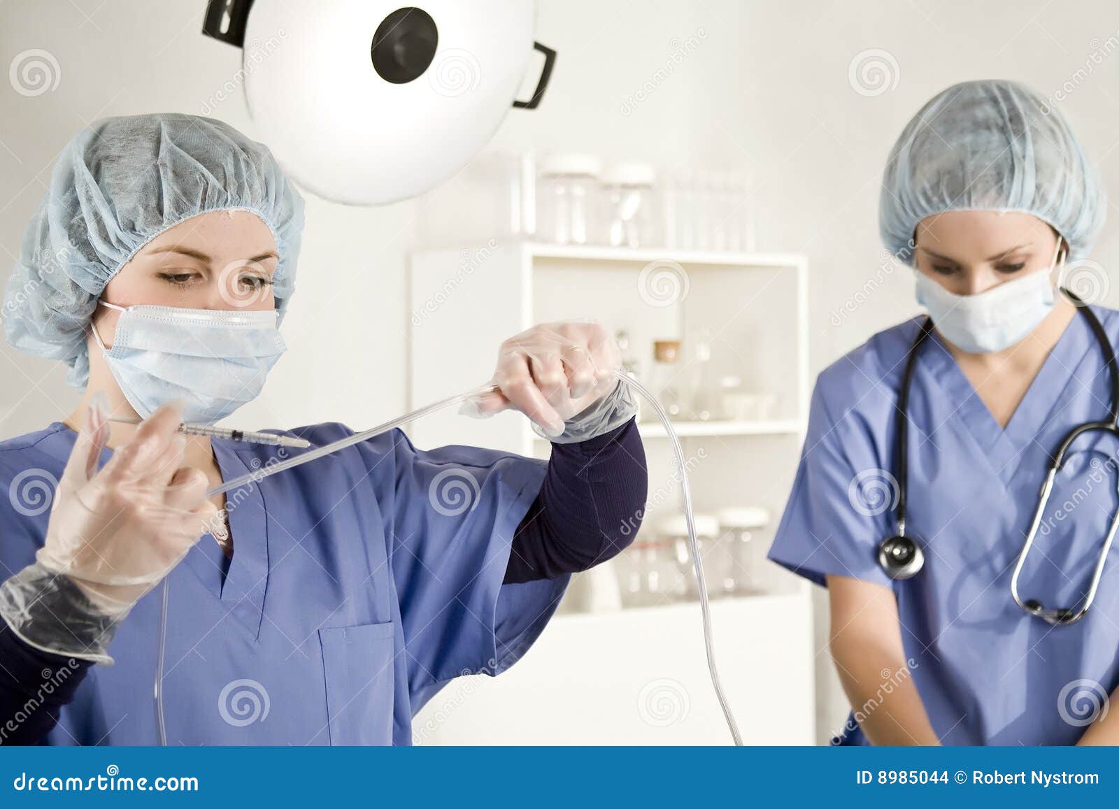 Nurse Injecting with Syringe into Iv Tube Stock Photo - Image of care ...