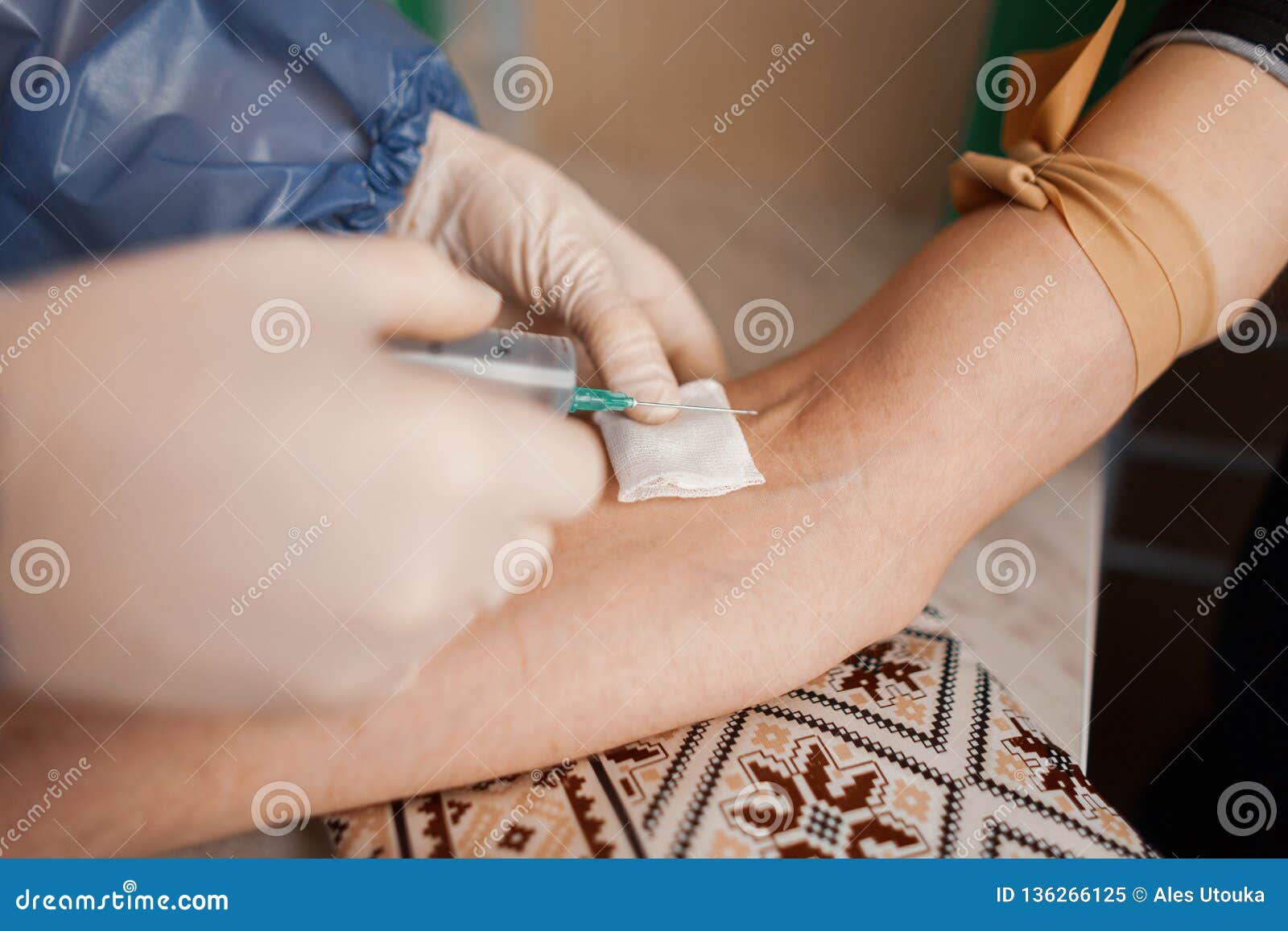 A Nurse Injects A Flu Vaccine Into A Young Man`s Vein A Doctor Giving