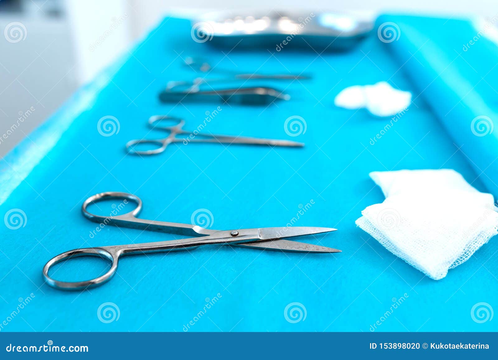 The Nurse is Laying Out a Sterile Instrument for Operating on the Table ...