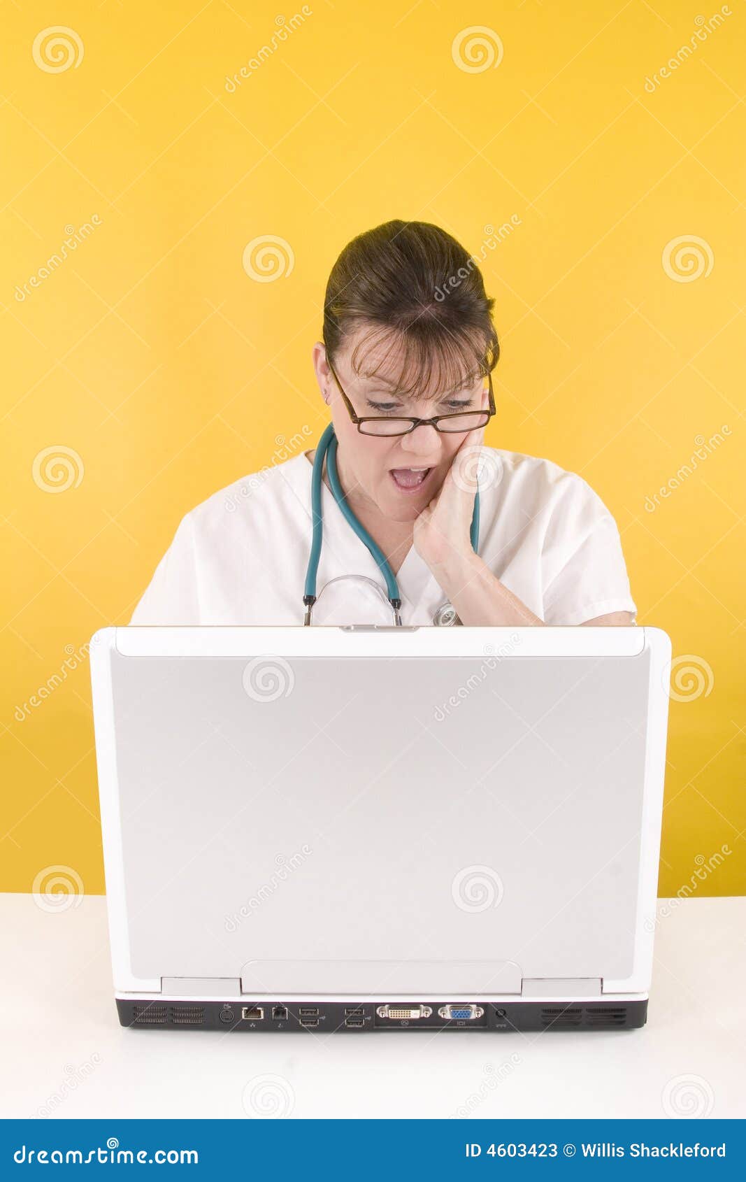 Nurse looking at computer stock image. Image of billing - 4603423