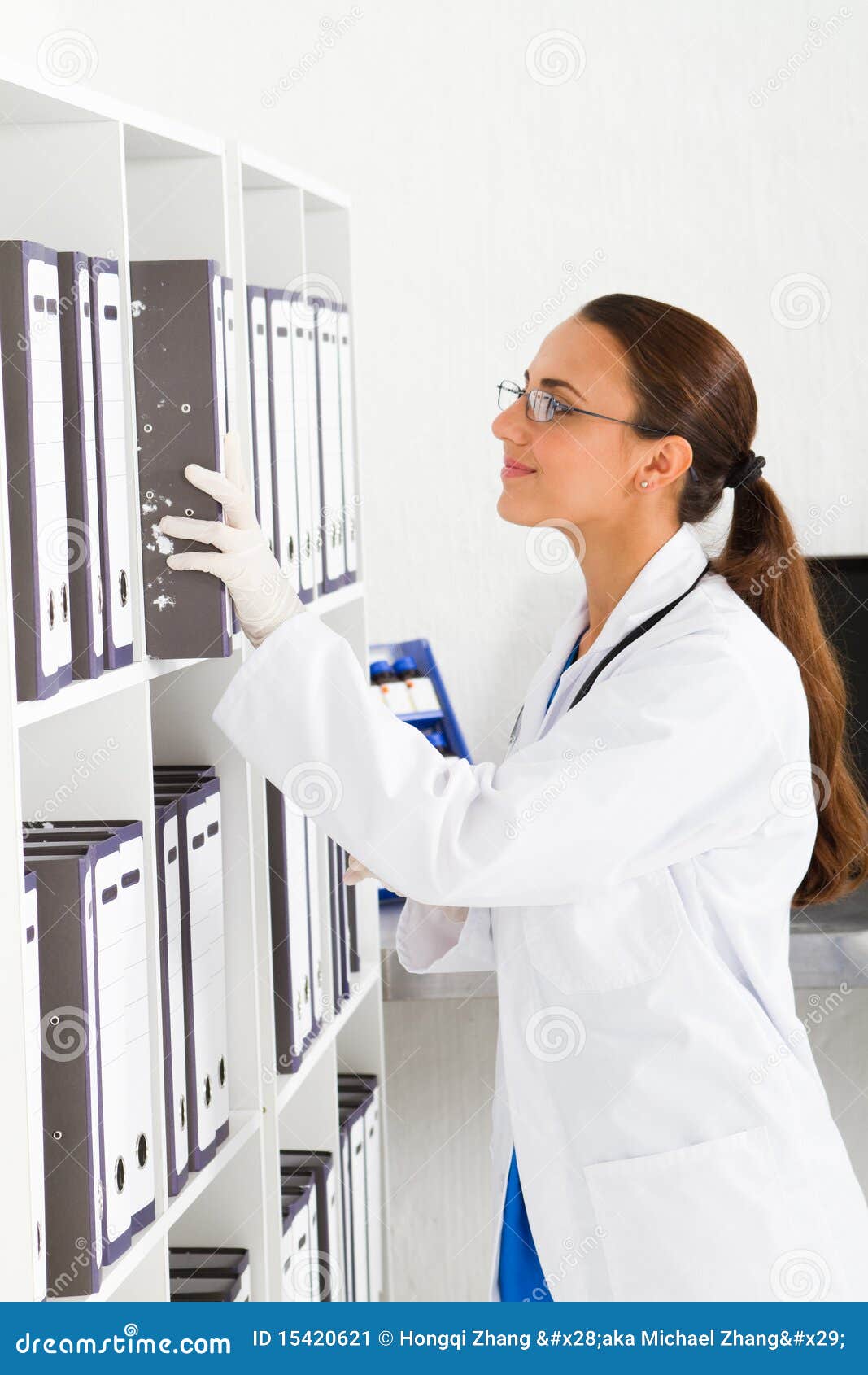 Nurse looking files stock image. Image of joyful, doctor - 15420621
