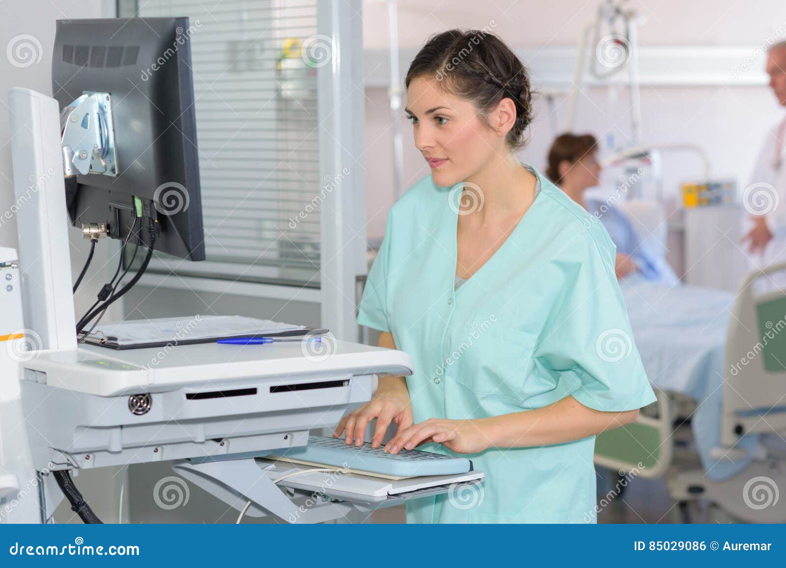 Nurse Looking at X-rays on Computer Screen Stock Photo - Image of ...