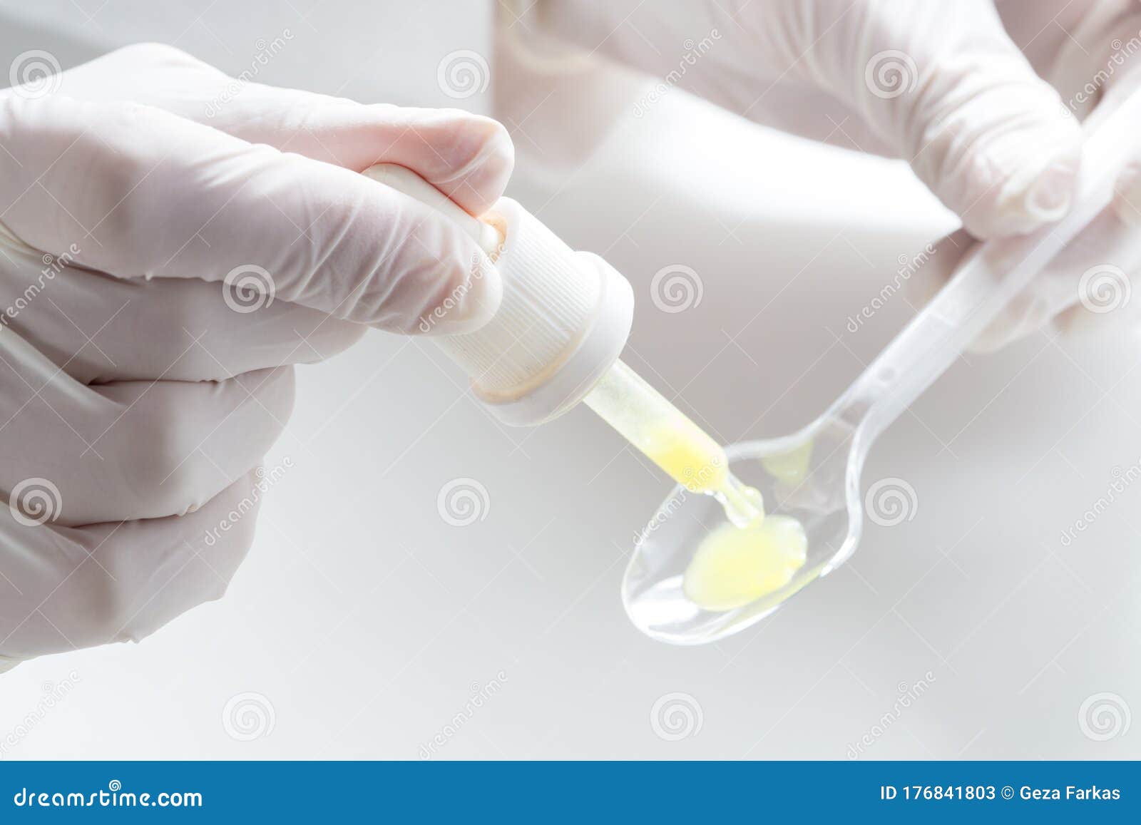 Nurse Make a Cough Syrup Dose with Pipette and Spoon Stock Image ...