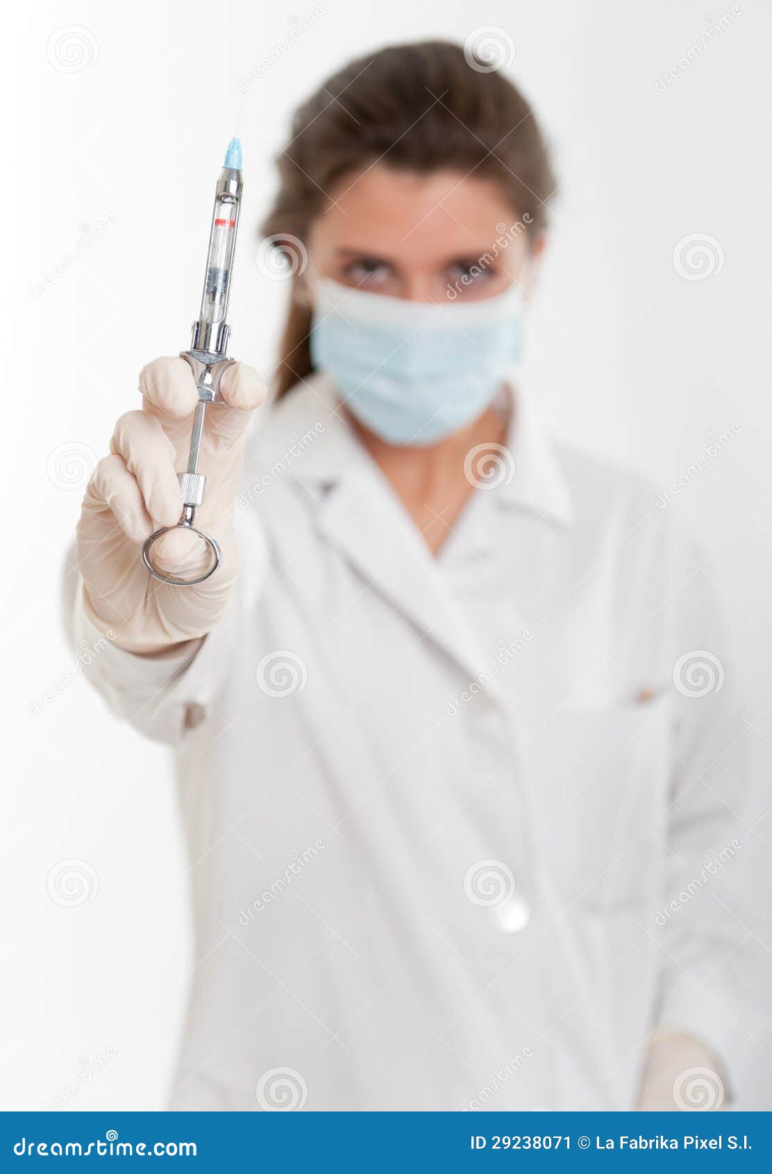 Nurse with Mask Showing a Syringe Stock Image - Image of surgical, drug ...