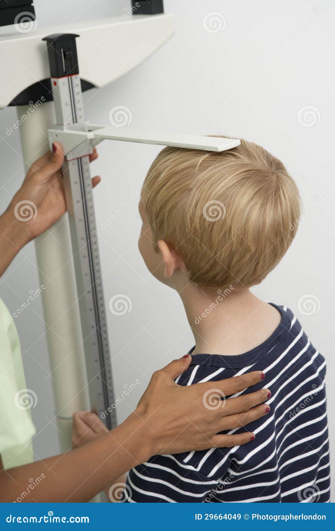 Nurse Measuring Boy S Height Stock Image - Image of child, indian: 29664049