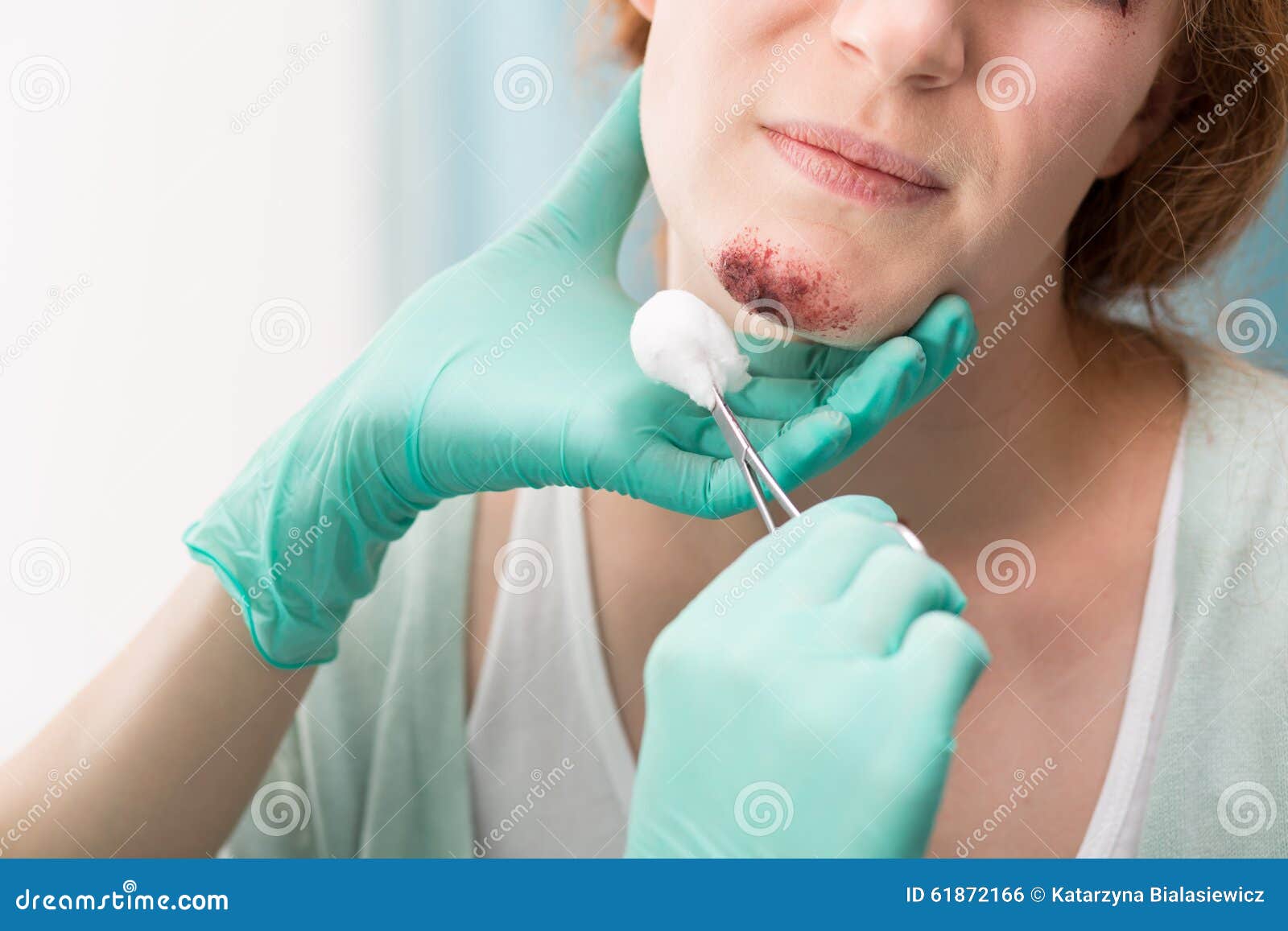 Nurse Medicating Wound on Face Stock Photo - Image of surgeon, women ...