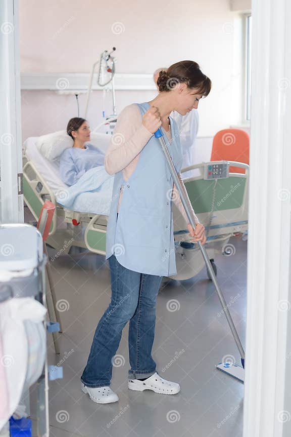 Nurse mopping room stock photo. Image of working, resting - 277791704