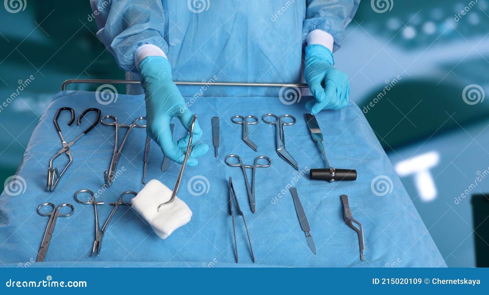 Nurse Near Table with Different Surgical Instruments in Operating Room ...