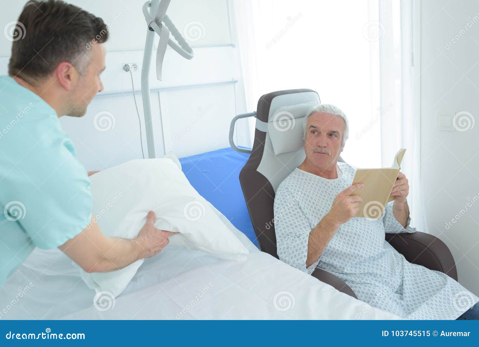 Nurse Next To Patient Reading Book Stock Image - Image of nurse ...