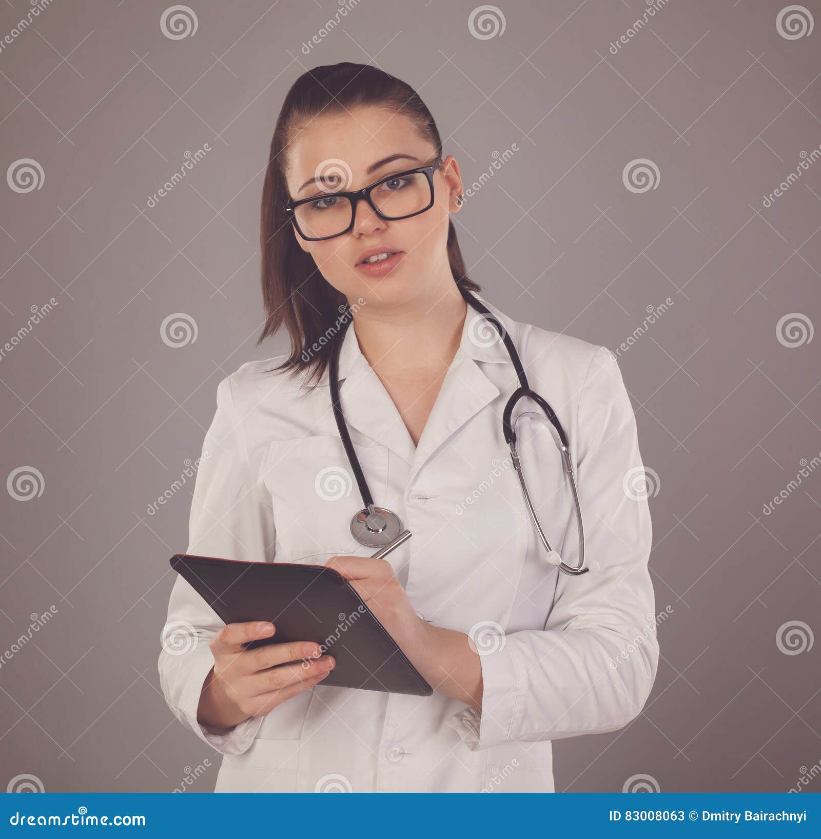 Nurse is noting something stock image. Image of collar - 83008063