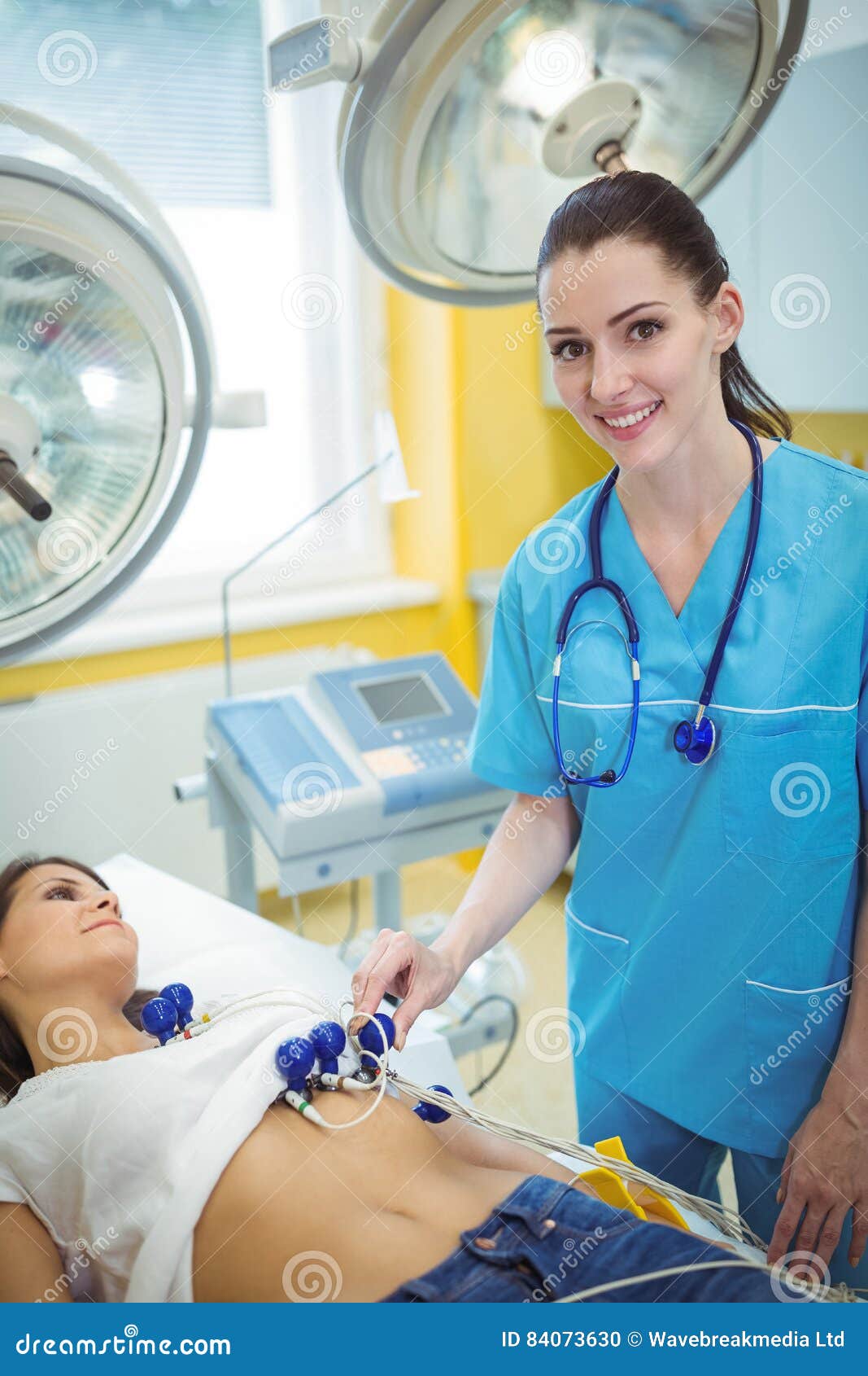 Nurse Performing an Electrocardiogram Test on the Patient Stock Photo ...