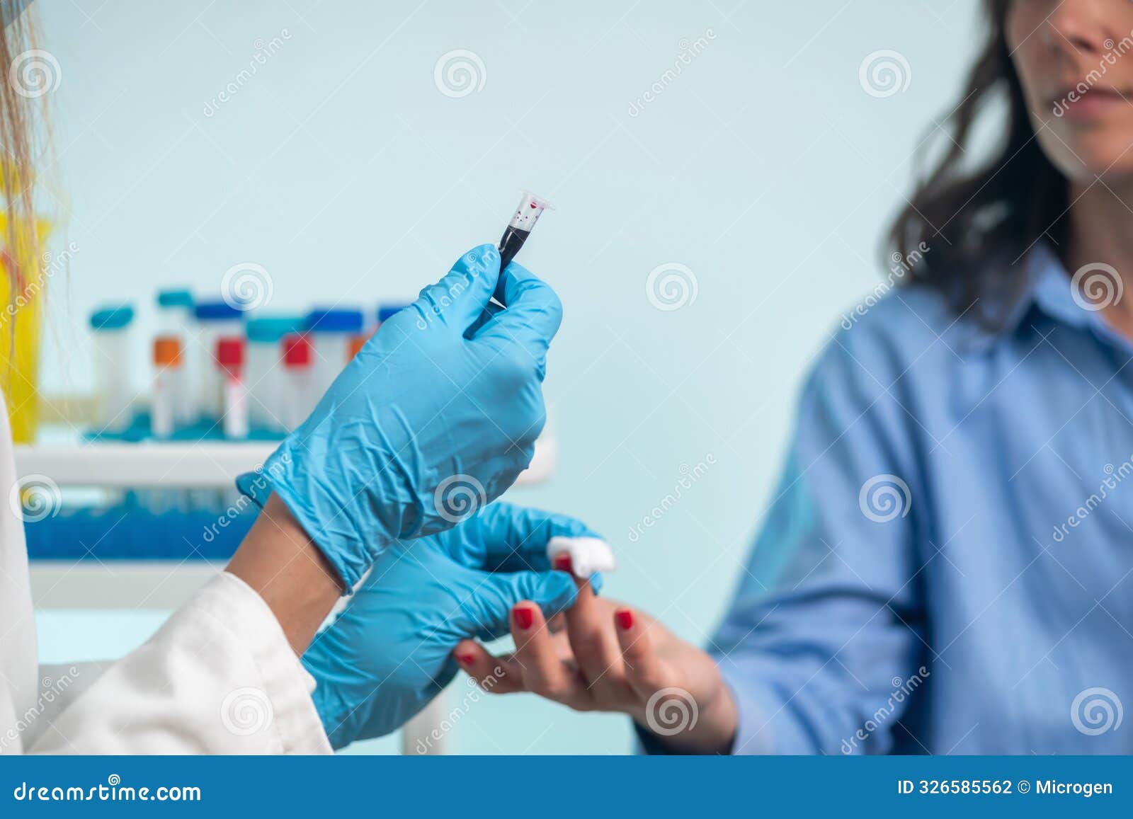 Nurse Performs Finger Blood Draw on Patient for Sample Collection Stock ...