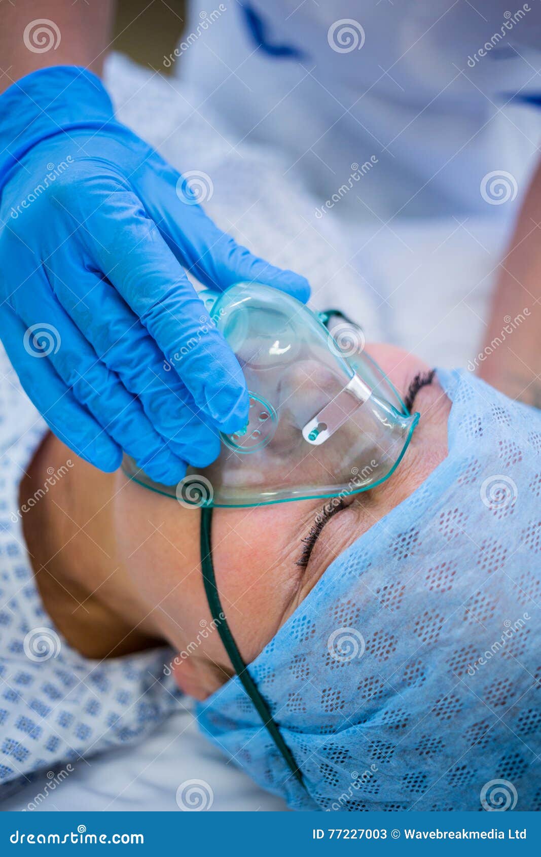 Nurse Placing an Oxygen Mask on the Face of a Patient Stock Image ...