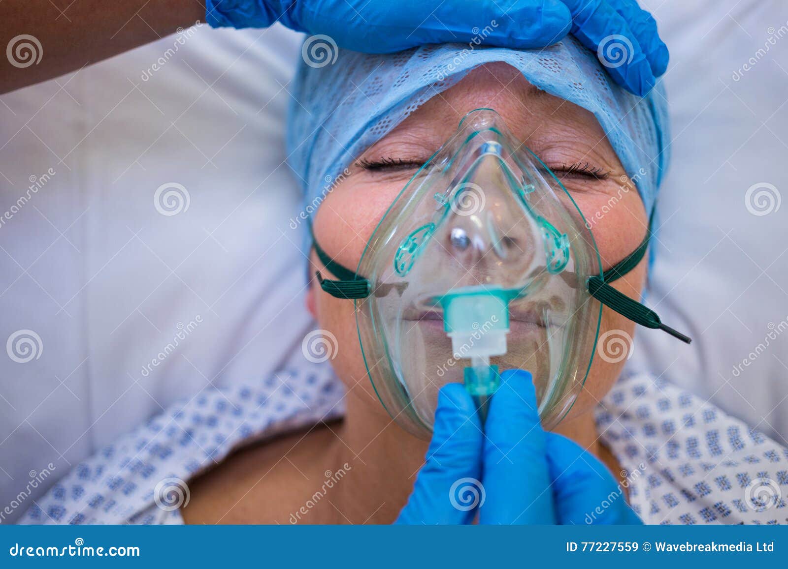 Nurse Placing an Oxygen Mask on the Face of a Patient Stock Image ...