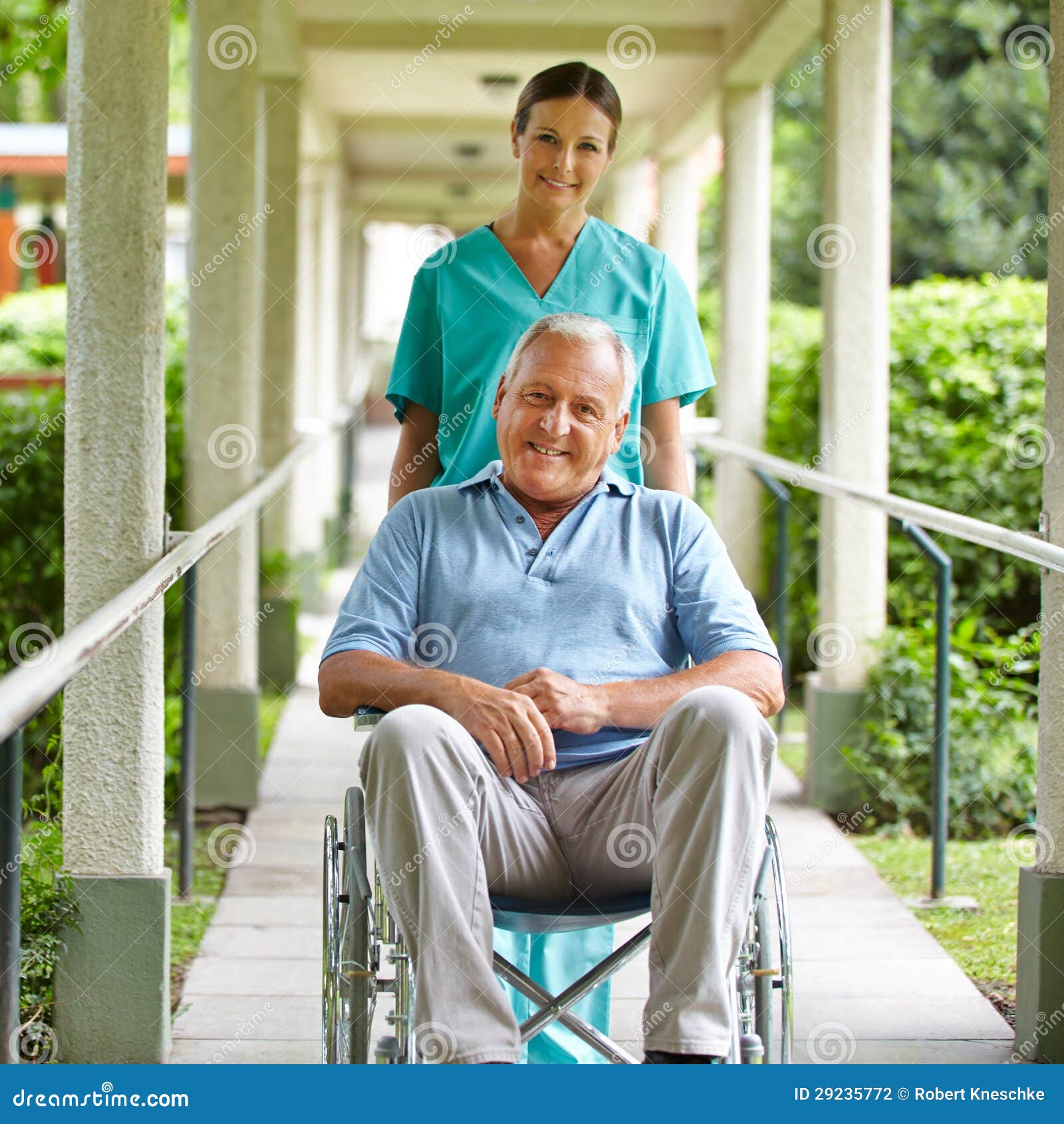 Nurse pushing wheelchair stock photo. Image of help, geriatric - 29235772