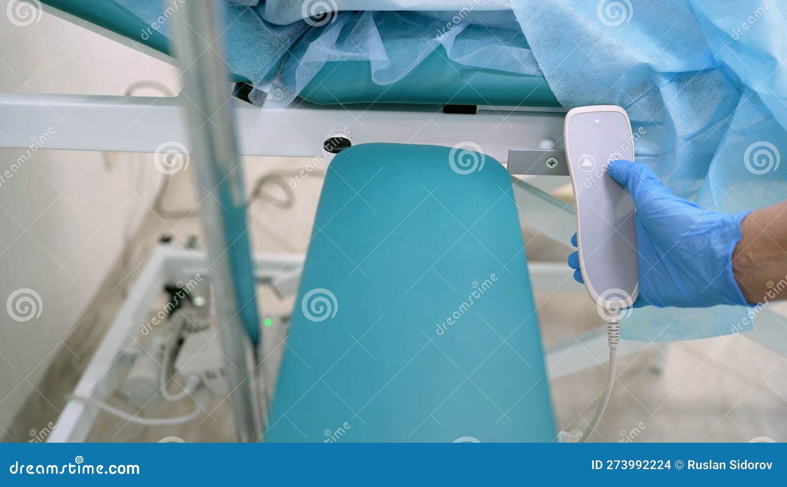 Using the Remote Control, the Nurse Raises the Couch. the Nurse Raises ...