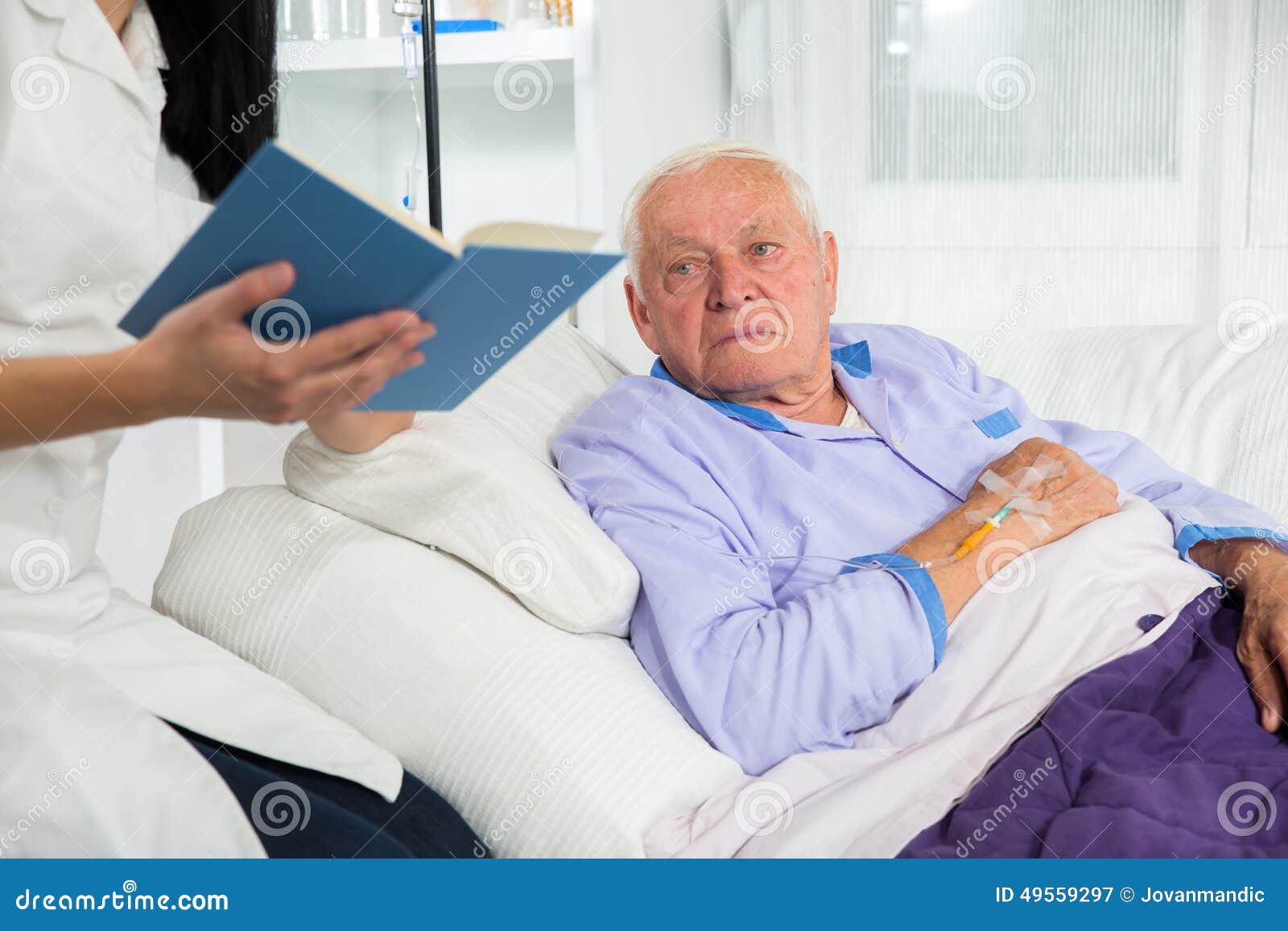 Nurse Reading a Book To His Patient Stock Image - Image of healthcare ...