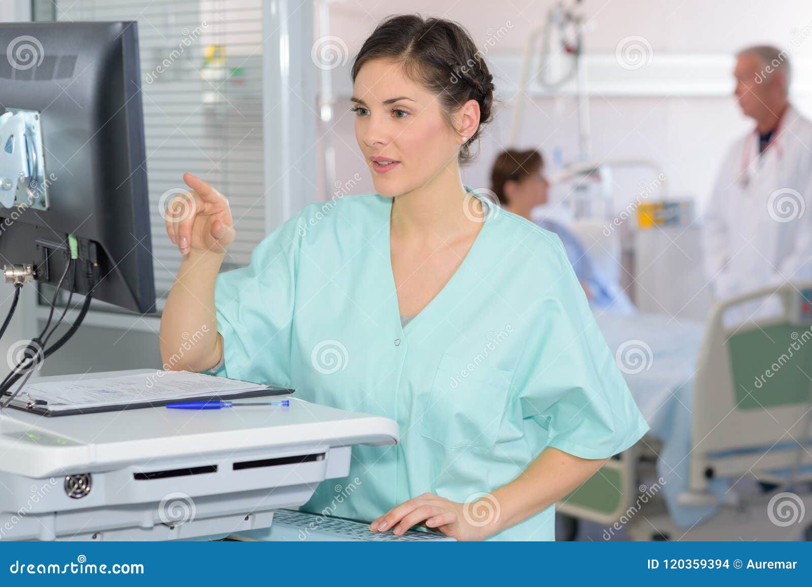 Nurse Reading Computer Screen Stock Photo - Image of healthcare ...