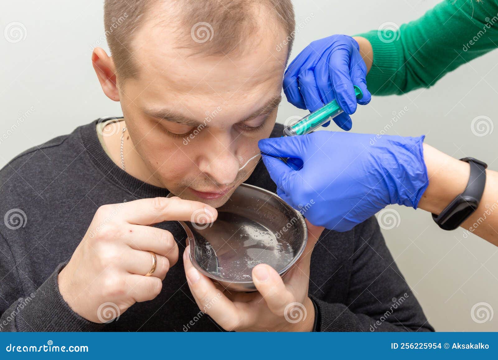 A Nurse Rinses the Nasal Cavity of a Patient Stock Photo - Image of ...