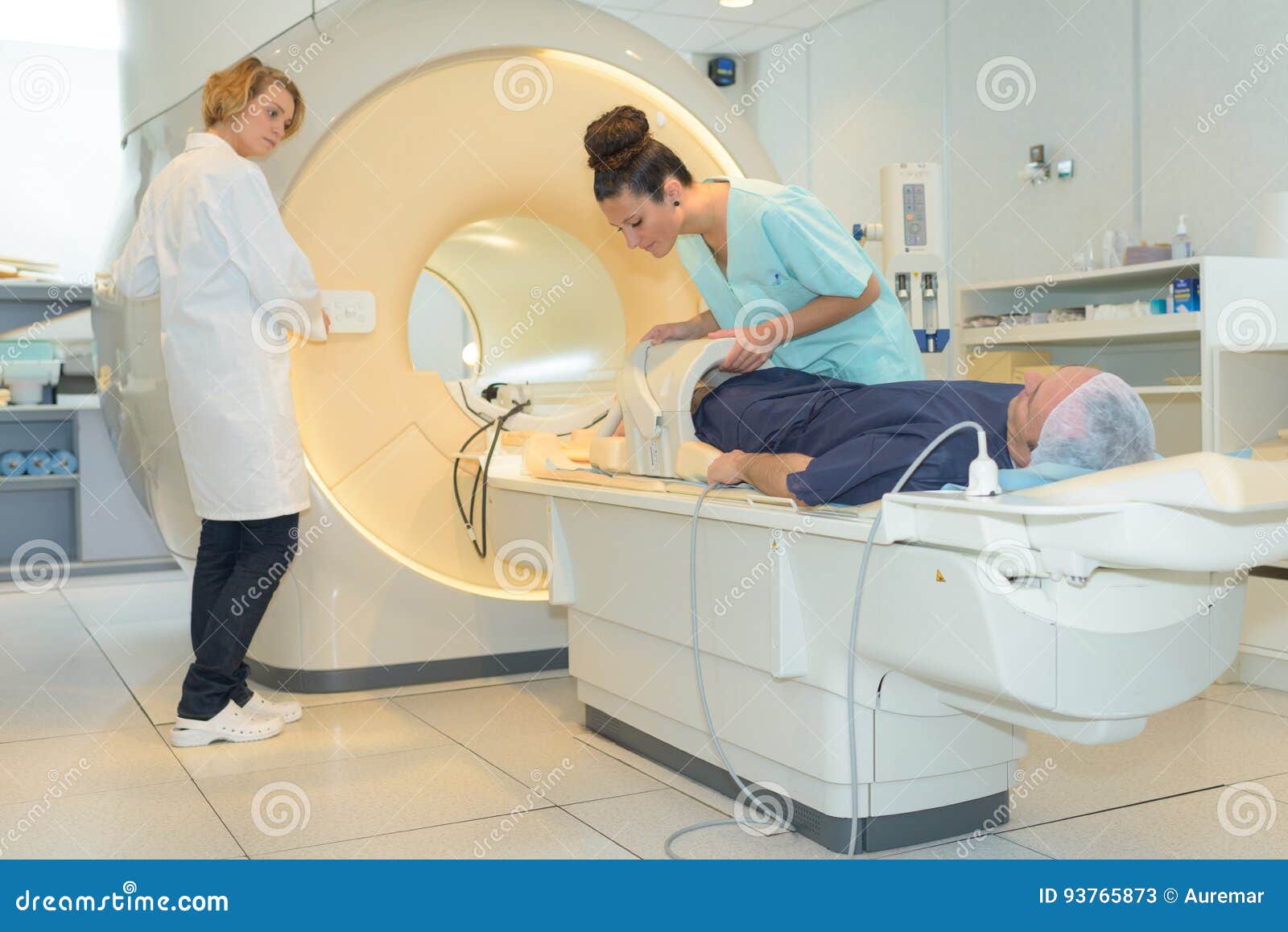 Nurse Setting Up Scanning Machine Patient Layed on Stock Image - Image ...