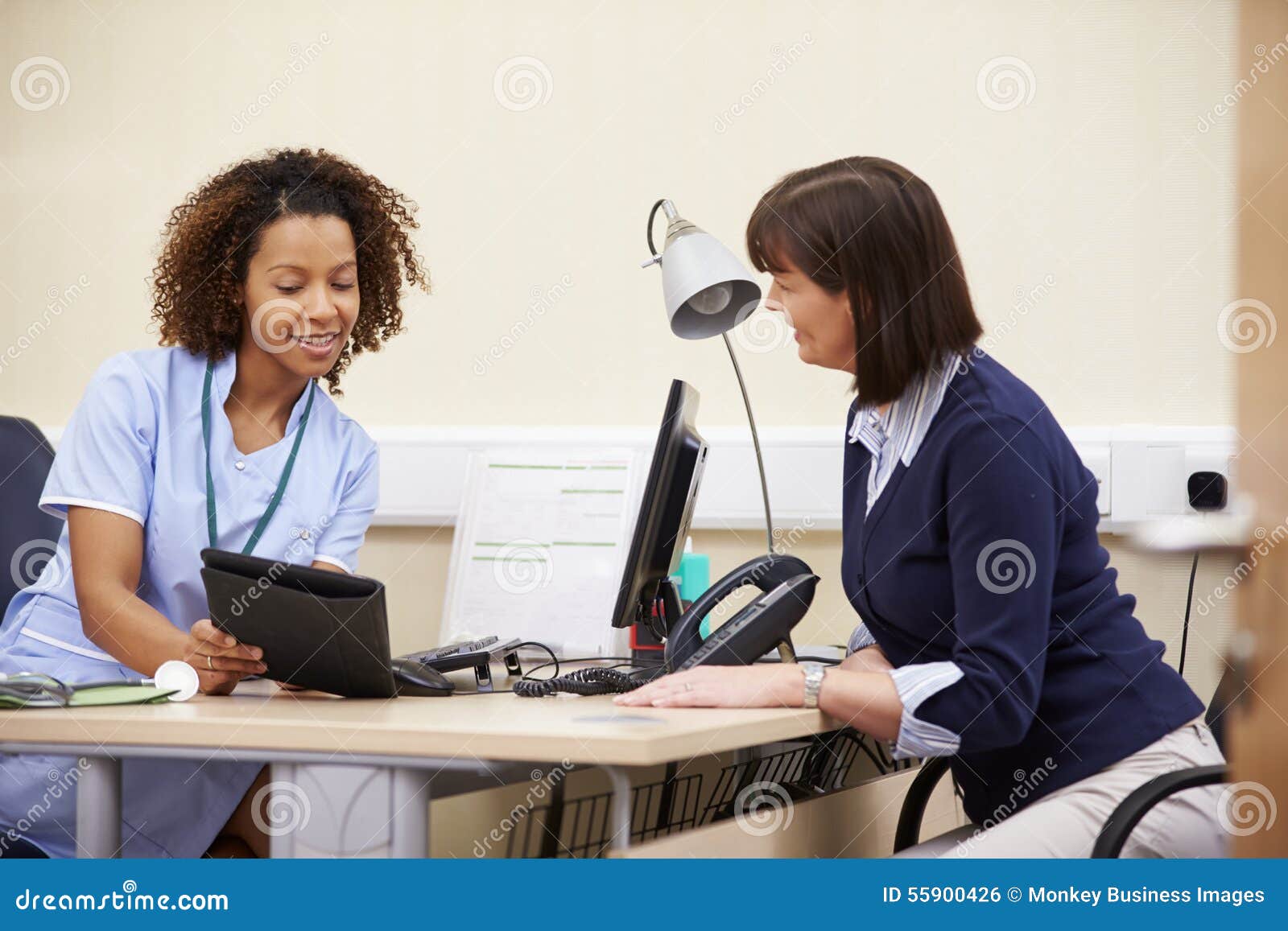 Nurse Showing Patient Test Results on Digital Tablet Stock Photo ...