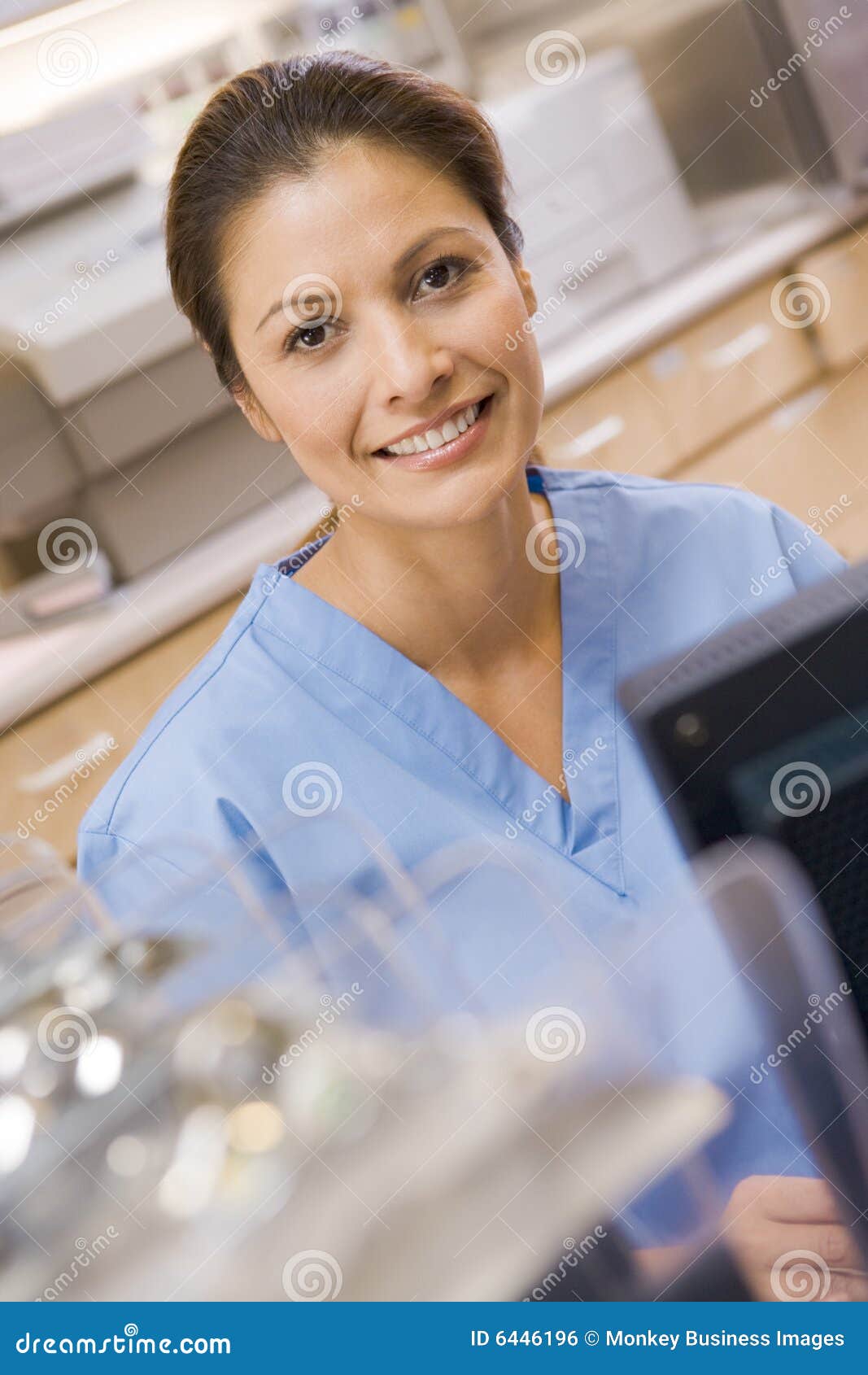 A Nurse Sitting at a Computer Stock Photo - Image of adult, caucasian ...