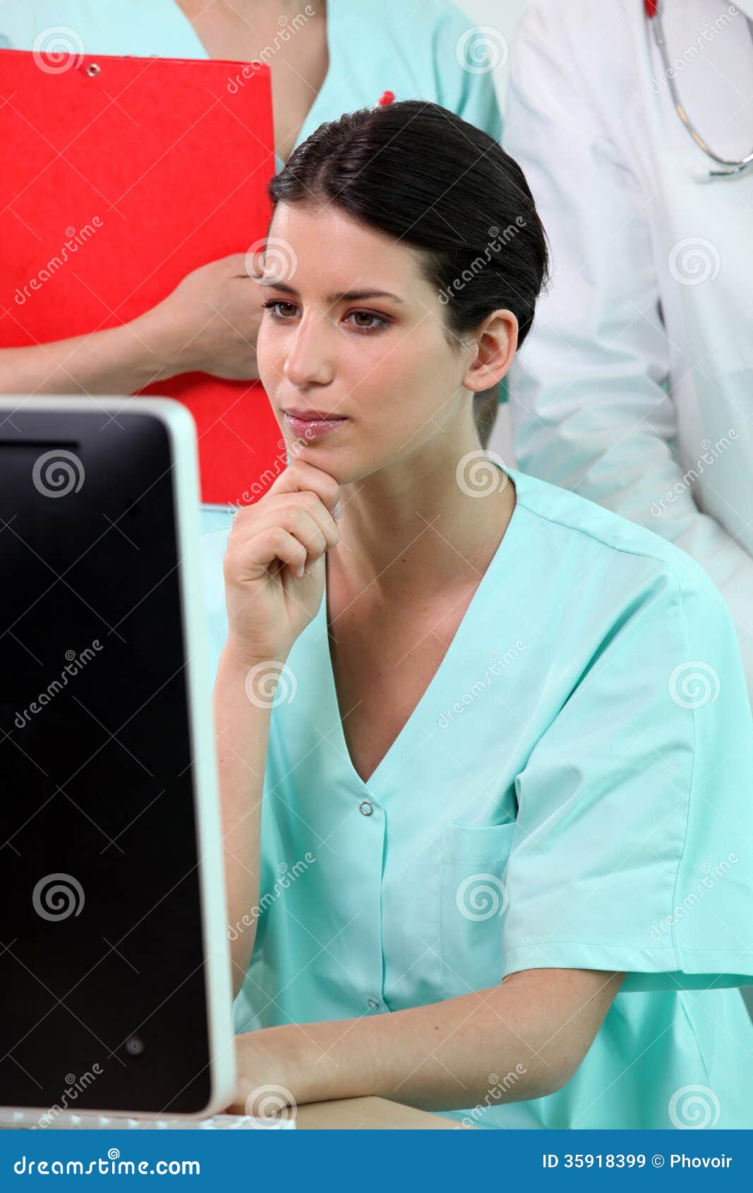 Nurse sitting at her desk stock image. Image of medicine - 35918399