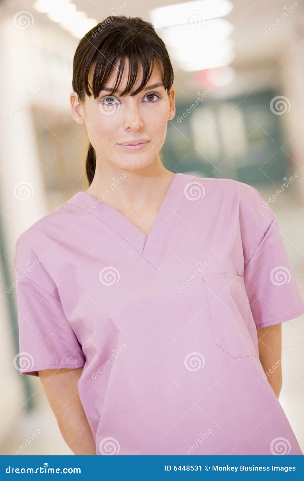 Nurse Standing in a Hospital Corridor Stock Image - Image of vertical ...