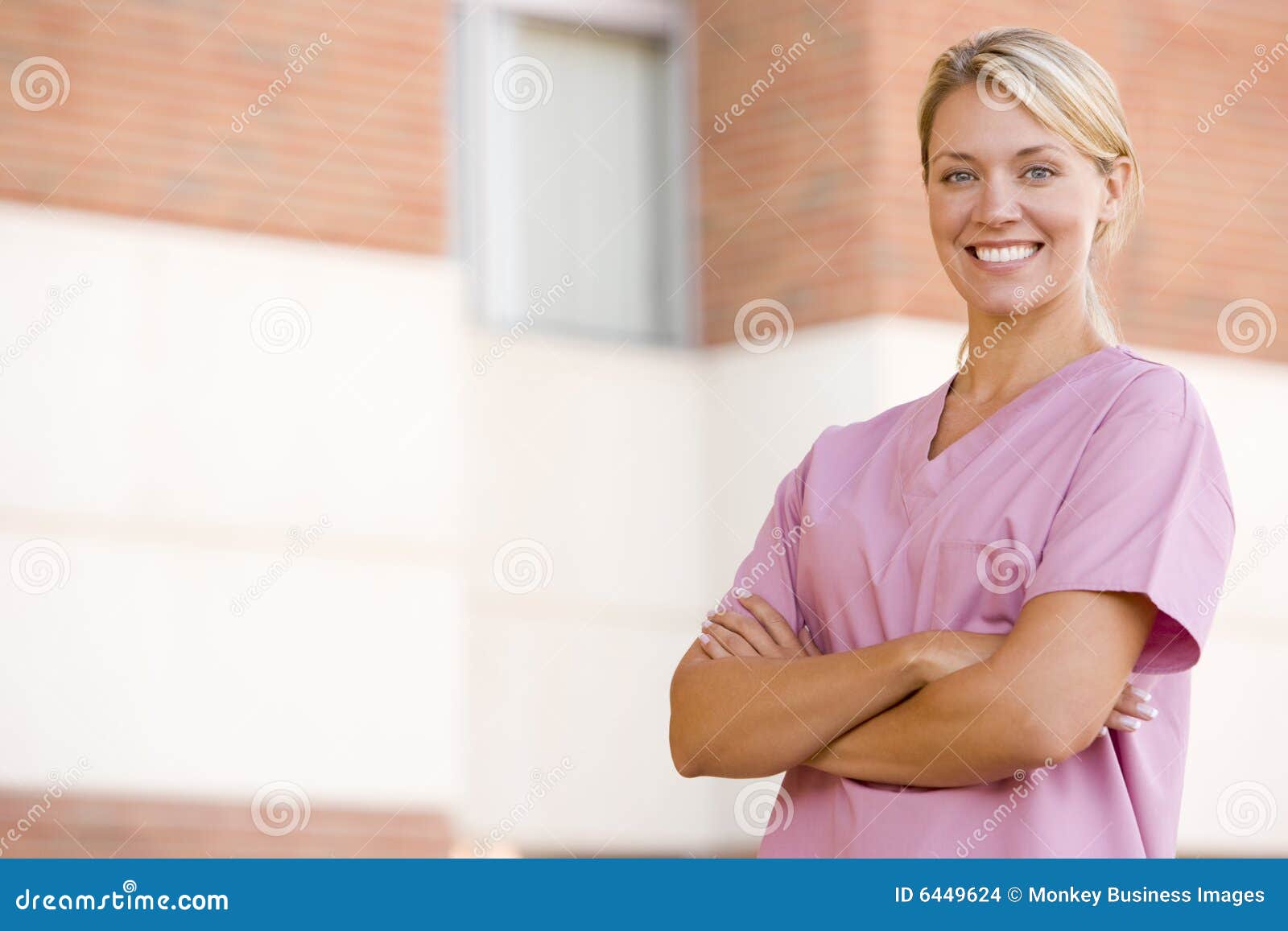 Nurse Standing Outside a Hospital Stock Photo - Image of outdoors ...
