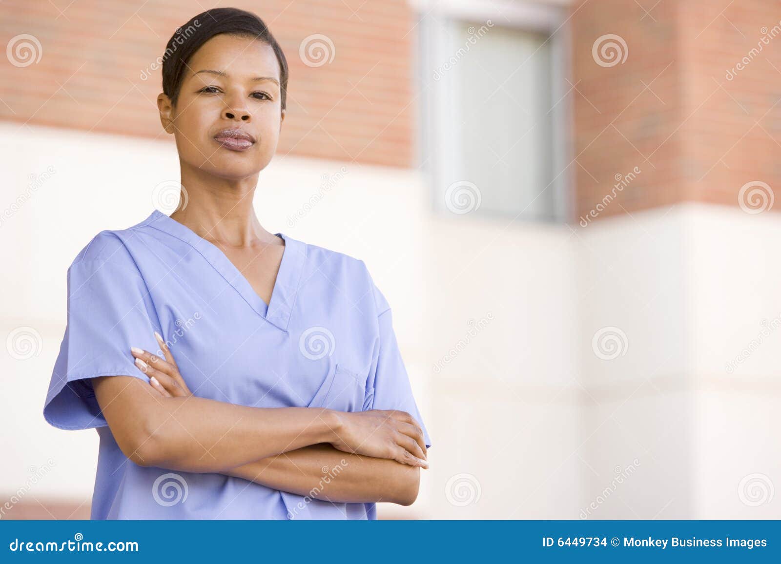 Nurse Standing Outside a Hospital Stock Photo - Image of crossed ...