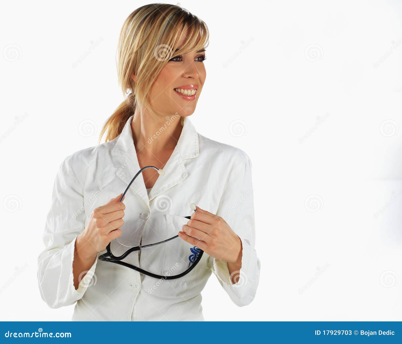 Nurse standing and smiling stock image. Image of care - 17929703