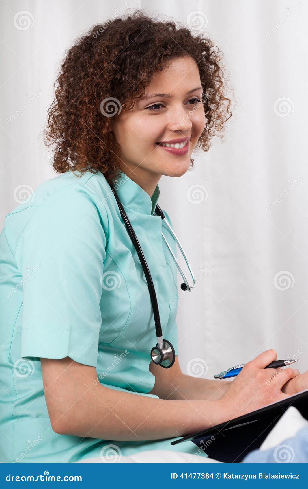 Nurse with Stethoscope Takes Notes Stock Photo - Image of clinic ...