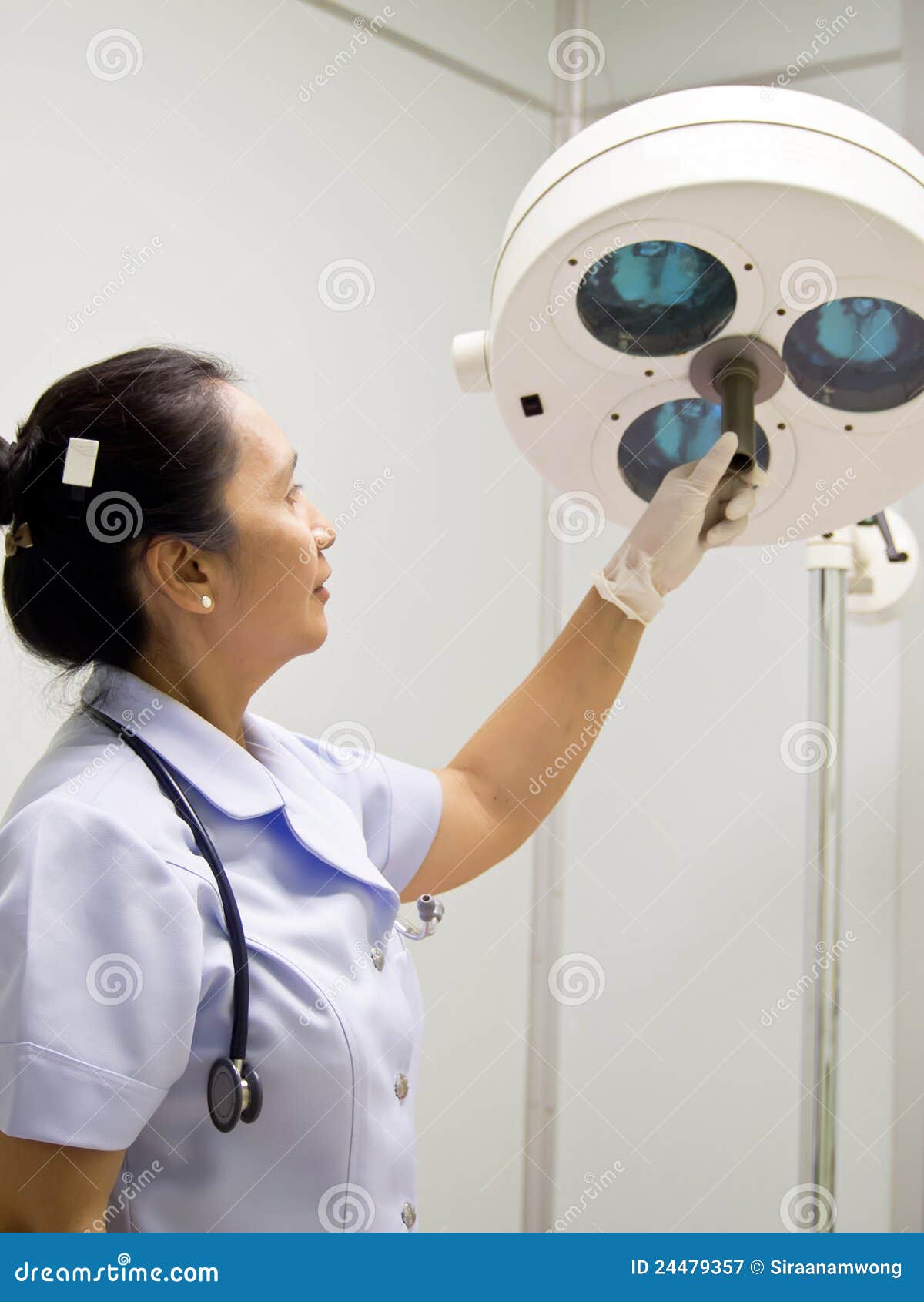 Nurse with surgical lamp stock image. Image of caucasian - 24479357