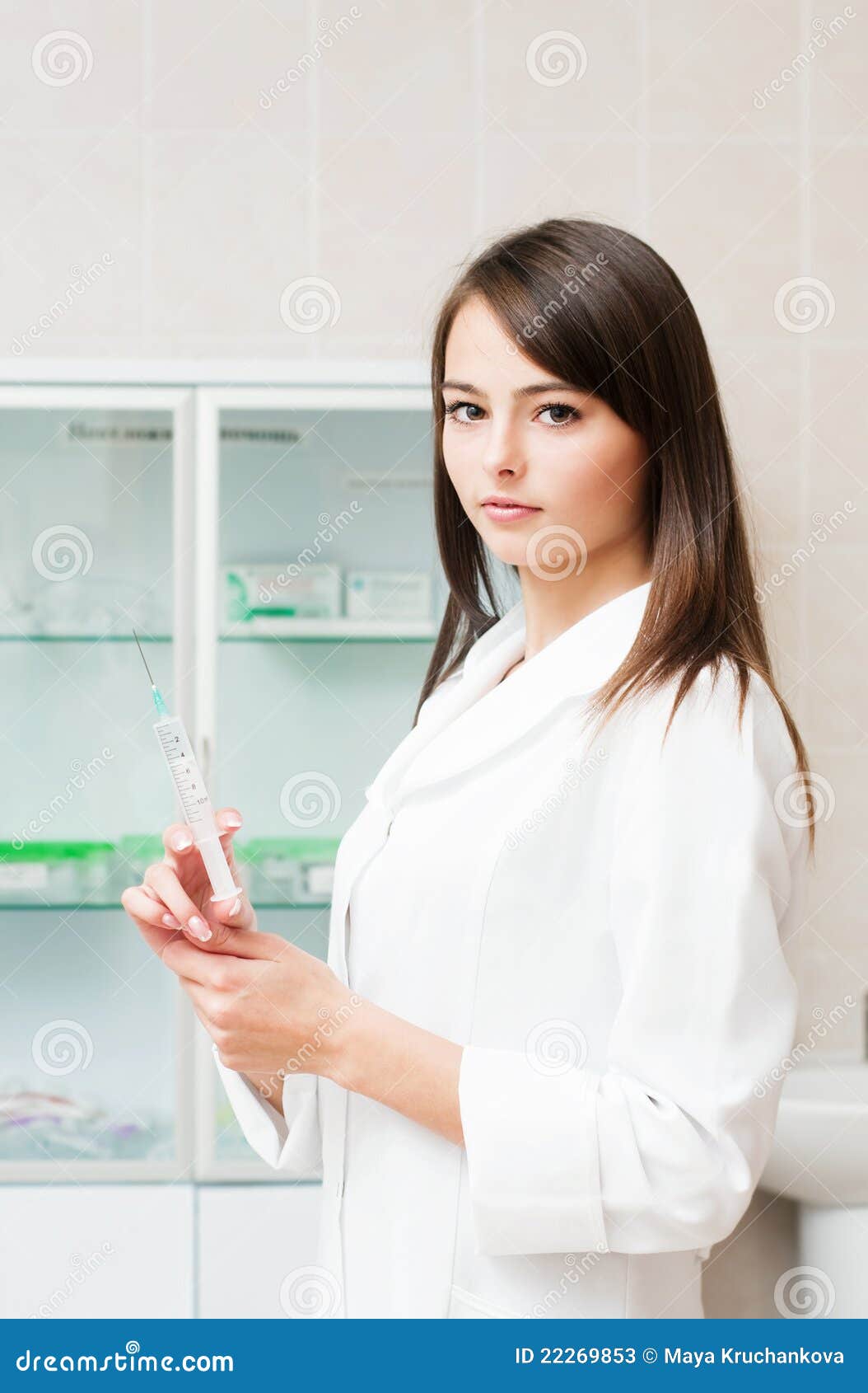 Nurse with syringe stock image. Image of brunette, beautiful - 22269853