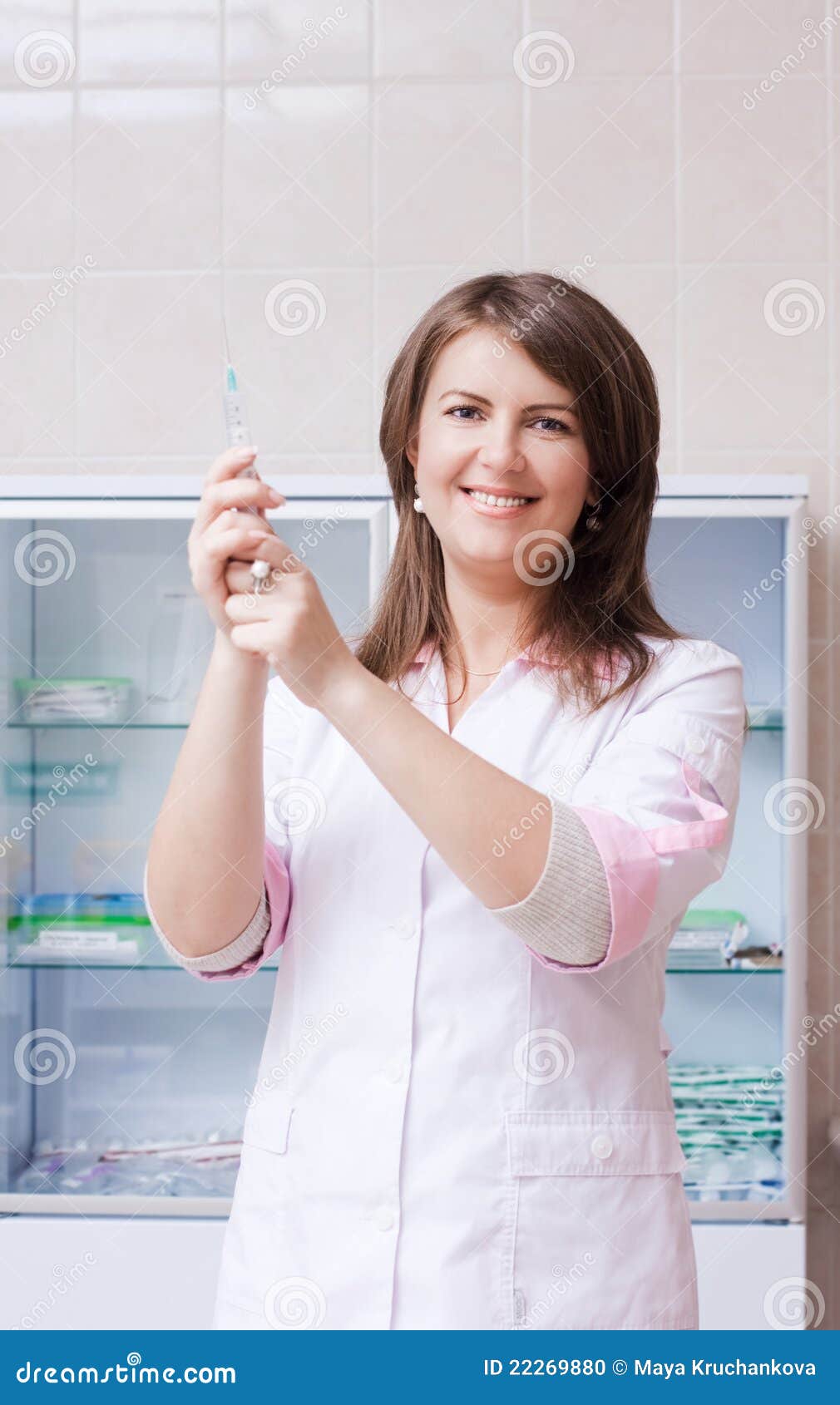 Nurse with syringe stock photo. Image of clinical, brunette - 22269880