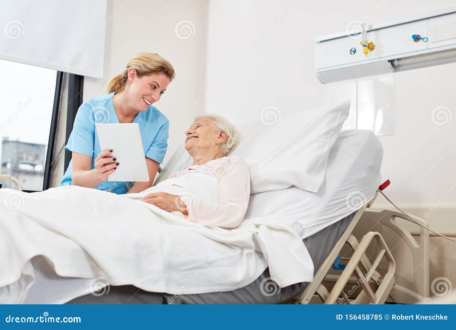 Nurse with tablet computer stock image. Image of care - 156458785