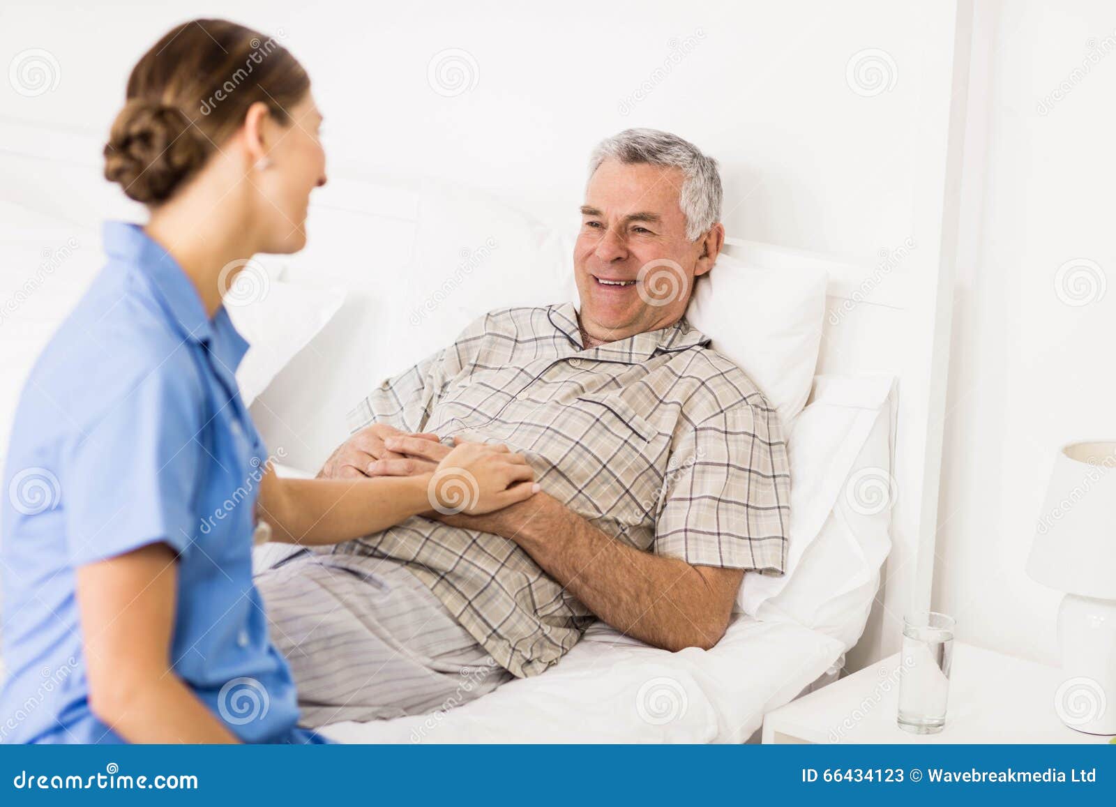 Nurse Taking Care of Suffering Senior Patient Stock Image - Image of ...