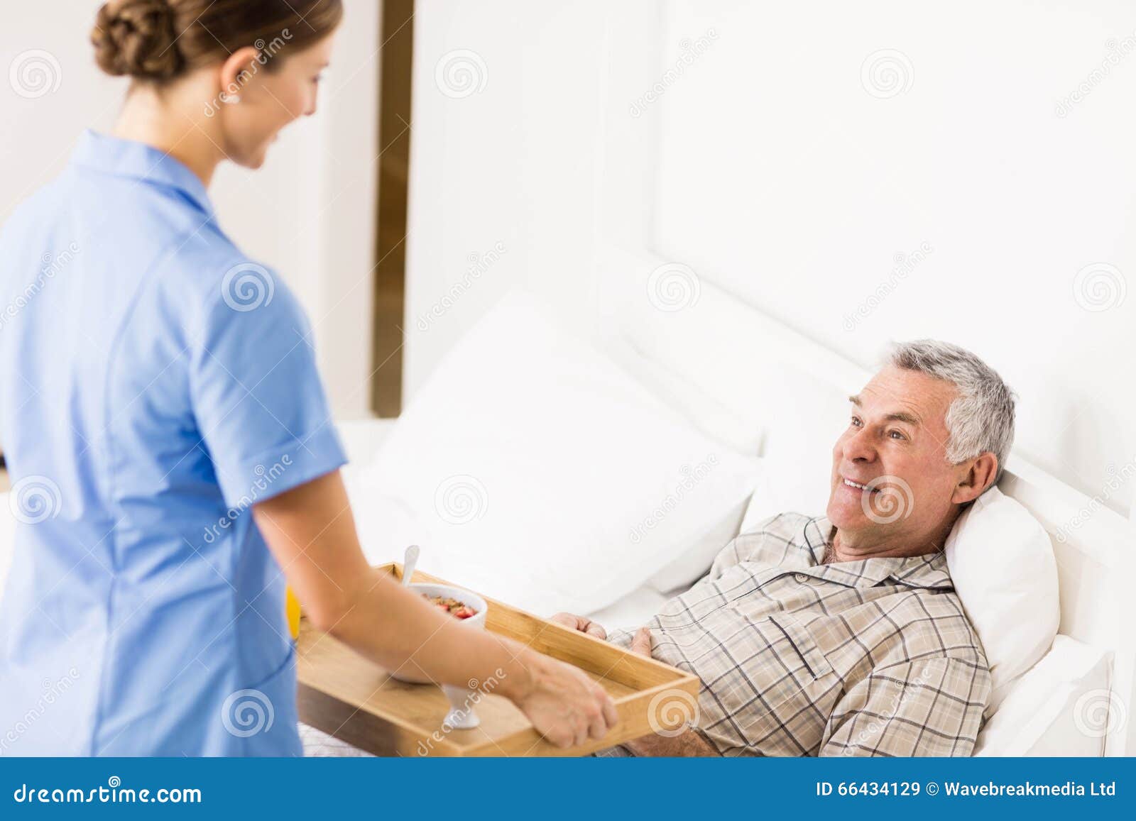 Nurse Taking Care of Suffering Senior Patient Stock Image - Image of ...