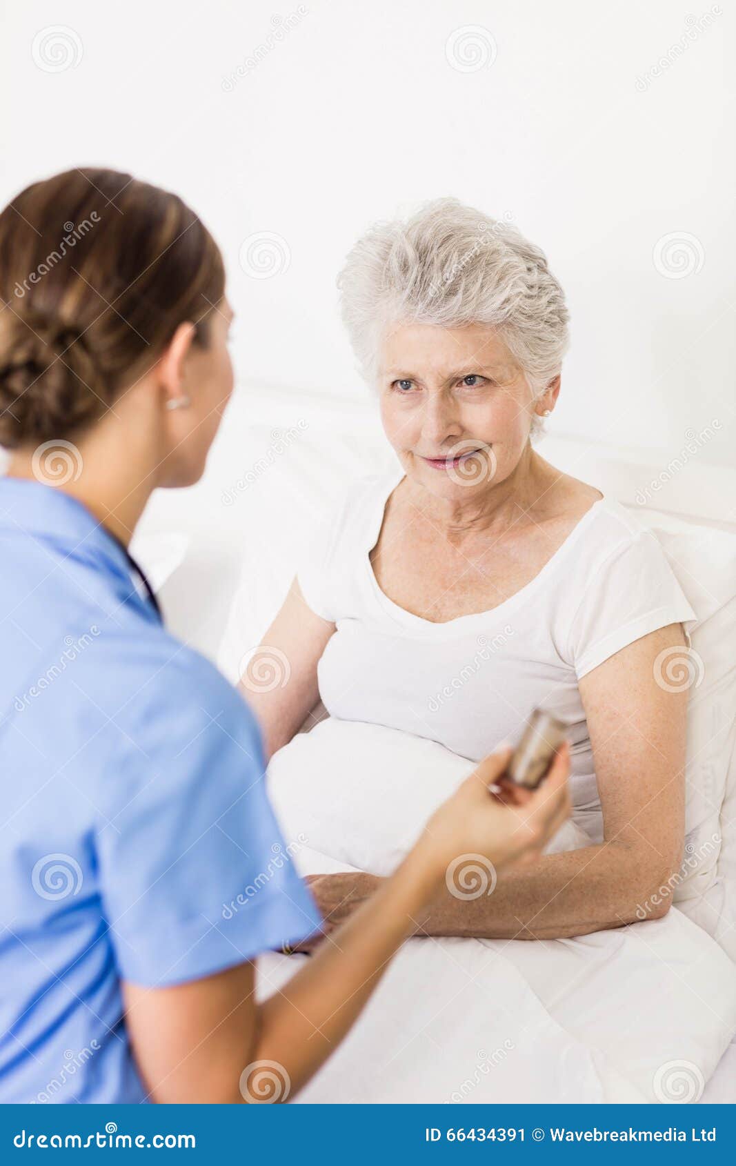 Nurse Taking Care of Suffering Senior Patient Stock Image - Image of ...