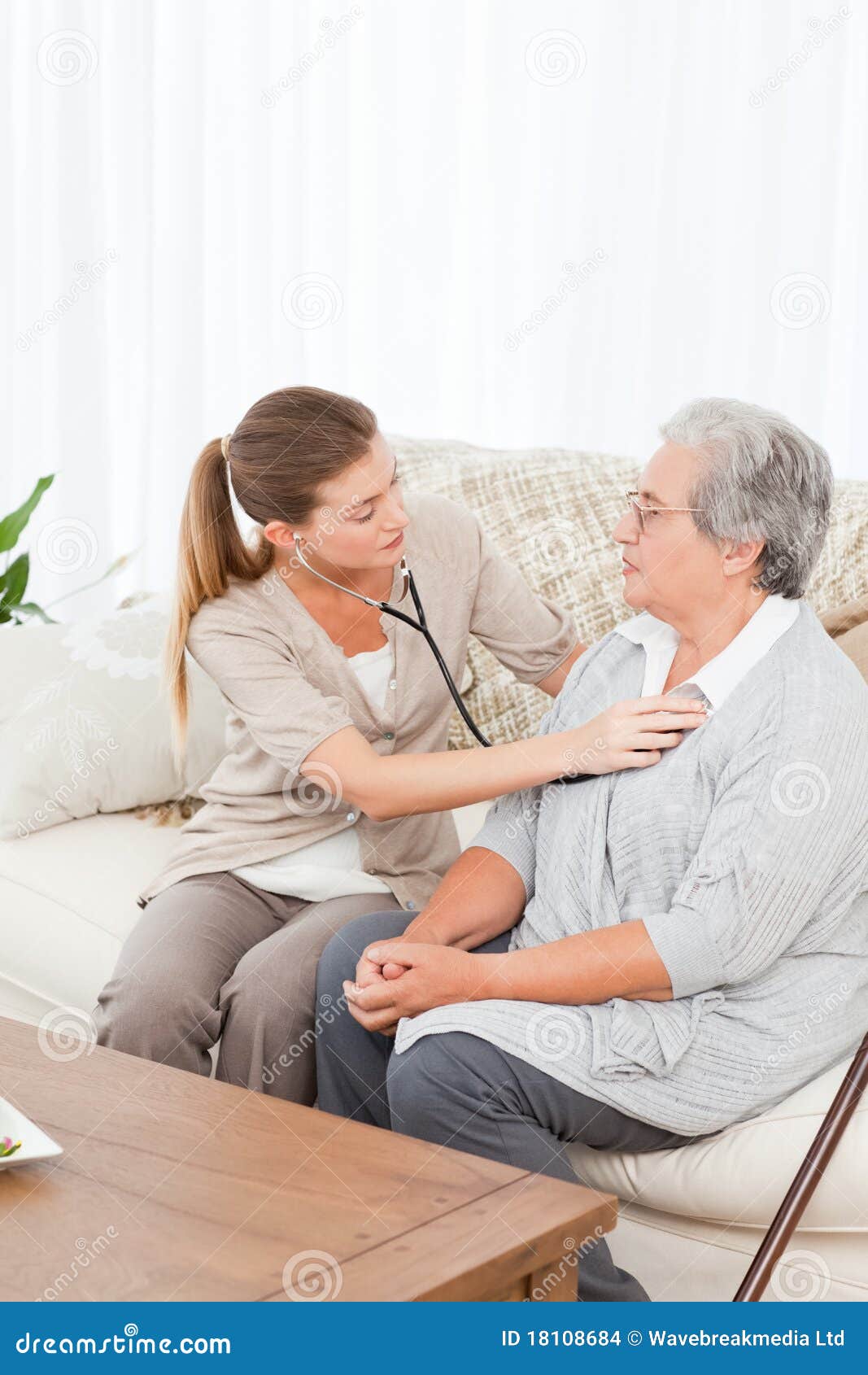 Nurse Taking the Heartbeat of Her Patient Stock Photo - Image of adult ...