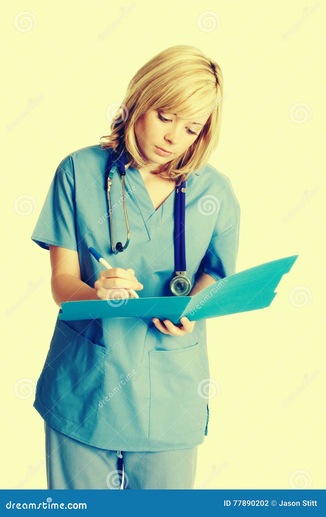 Nurse Taking Notes stock photo. Image of file, standing - 77890202
