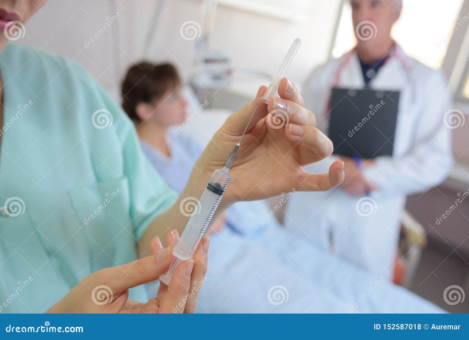 Nurse Taking Protective Sheath from Syringe Stock Photo - Image of ...