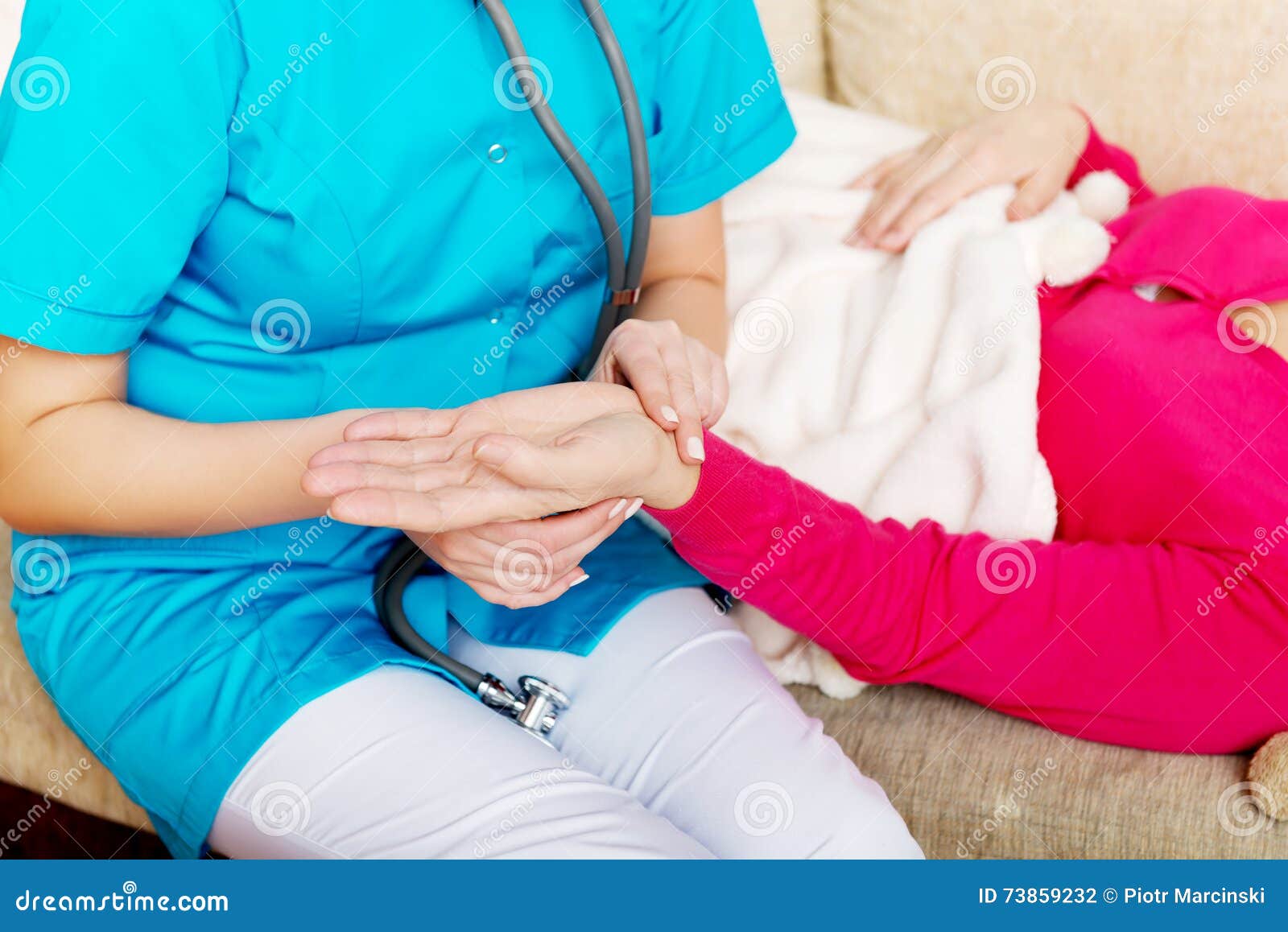 Nurse Taking the Pulse of Her Patient at Home Stock Photo - Image of ...