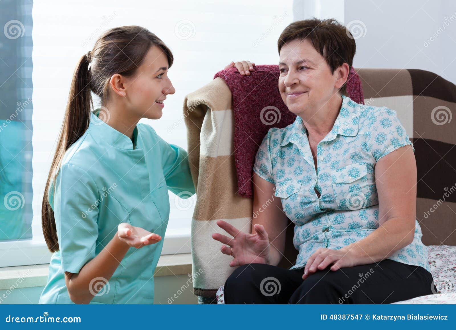 Nurse talking with patient stock image. Image of elderly - 48387547